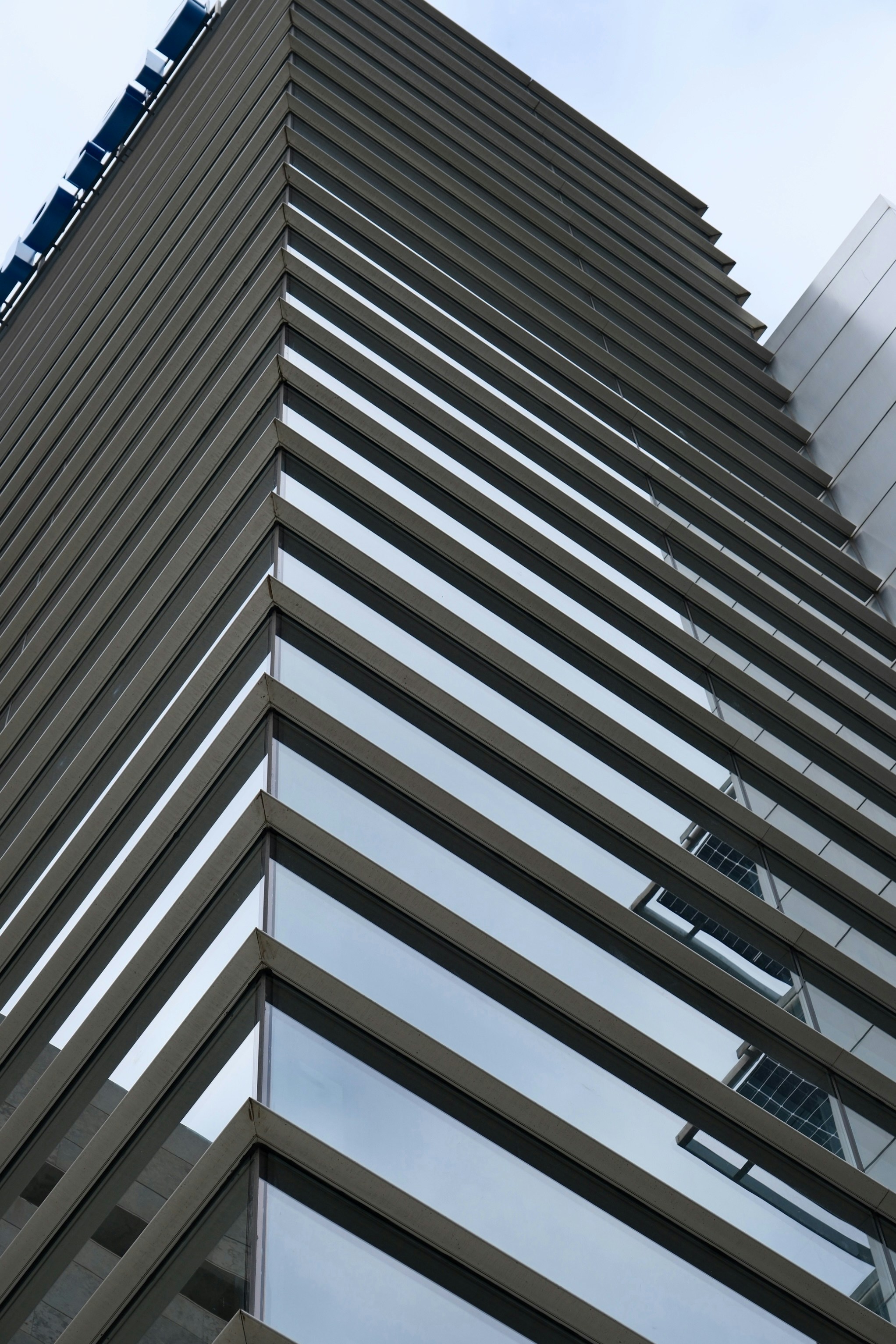 Vertical Facade: A Skyward Tetris of Glass and Steel