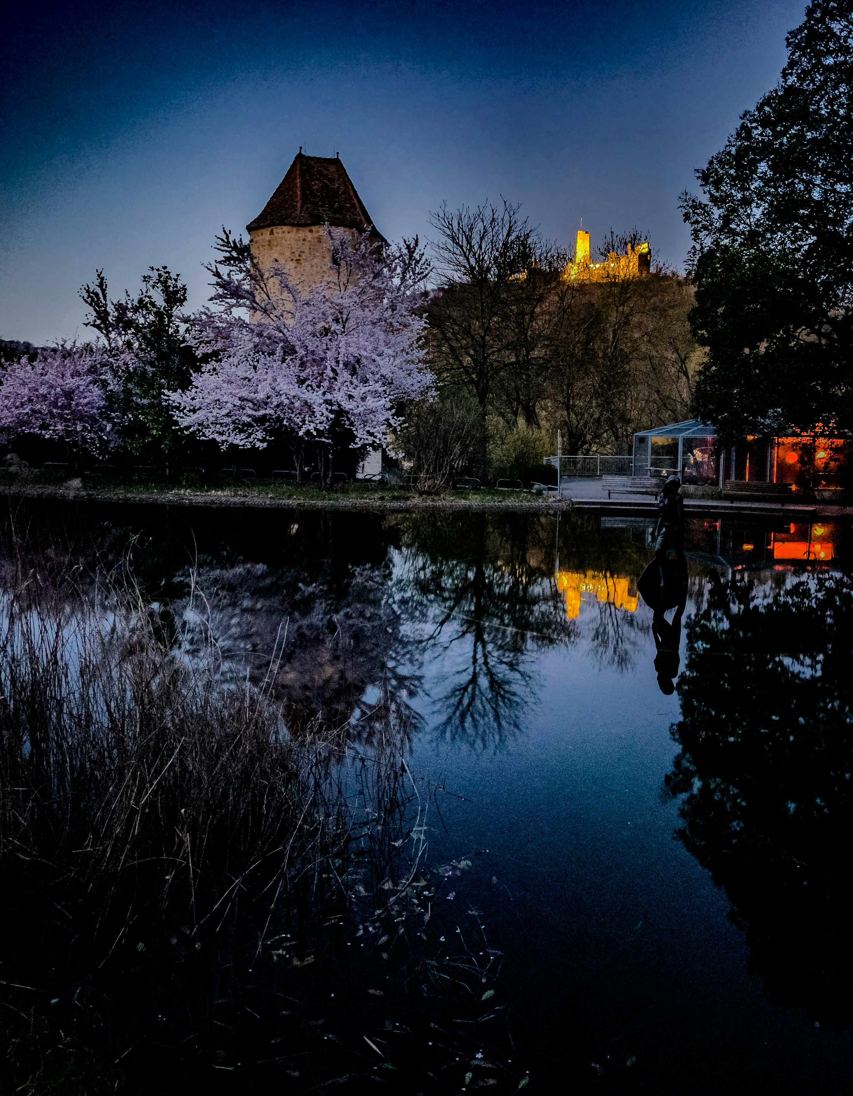 Twilight Gate: Castle Turrets Reflect on Quiet Water