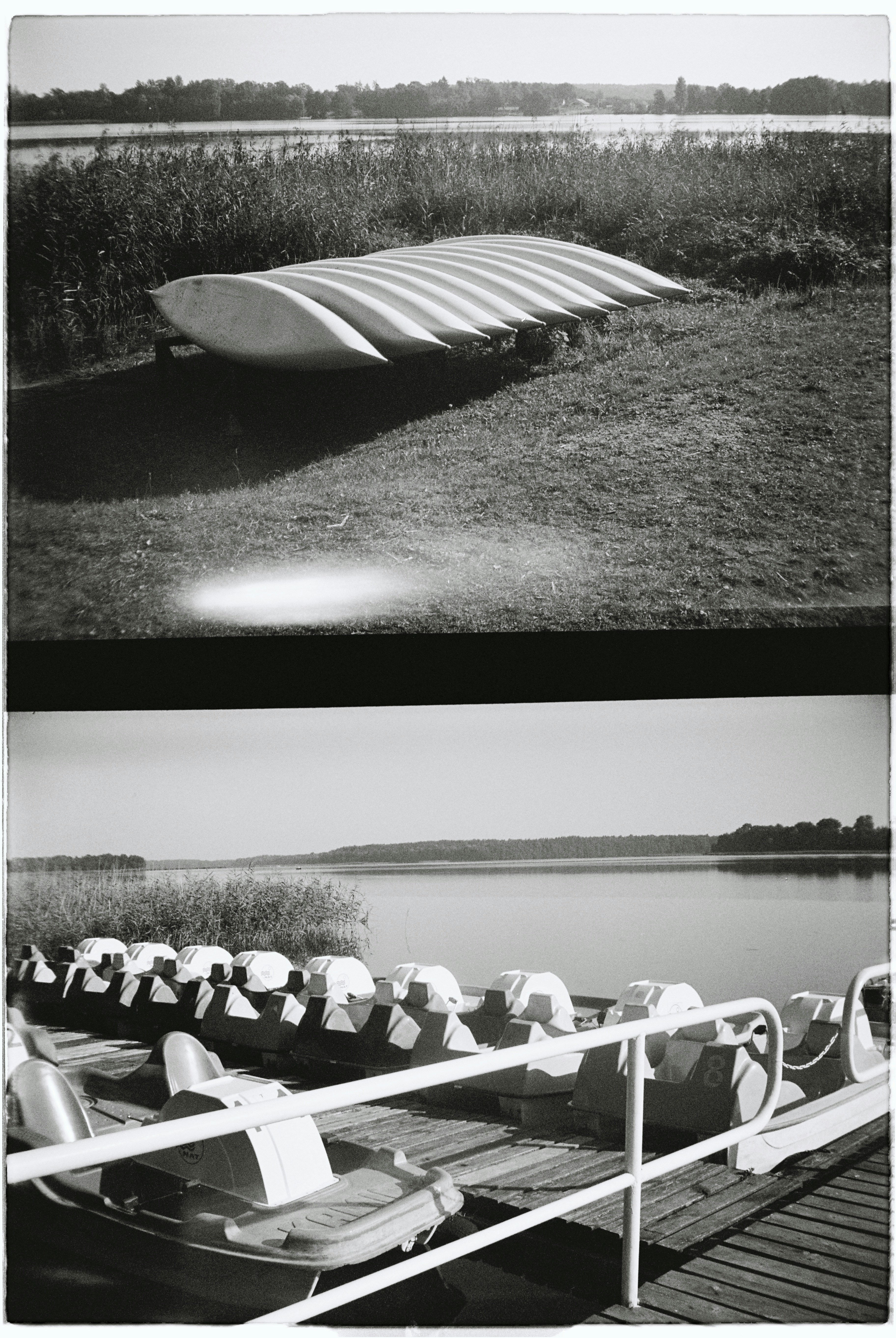 Rowing Boats and Reflection: A Quiet Lakeside Moment in Black and White