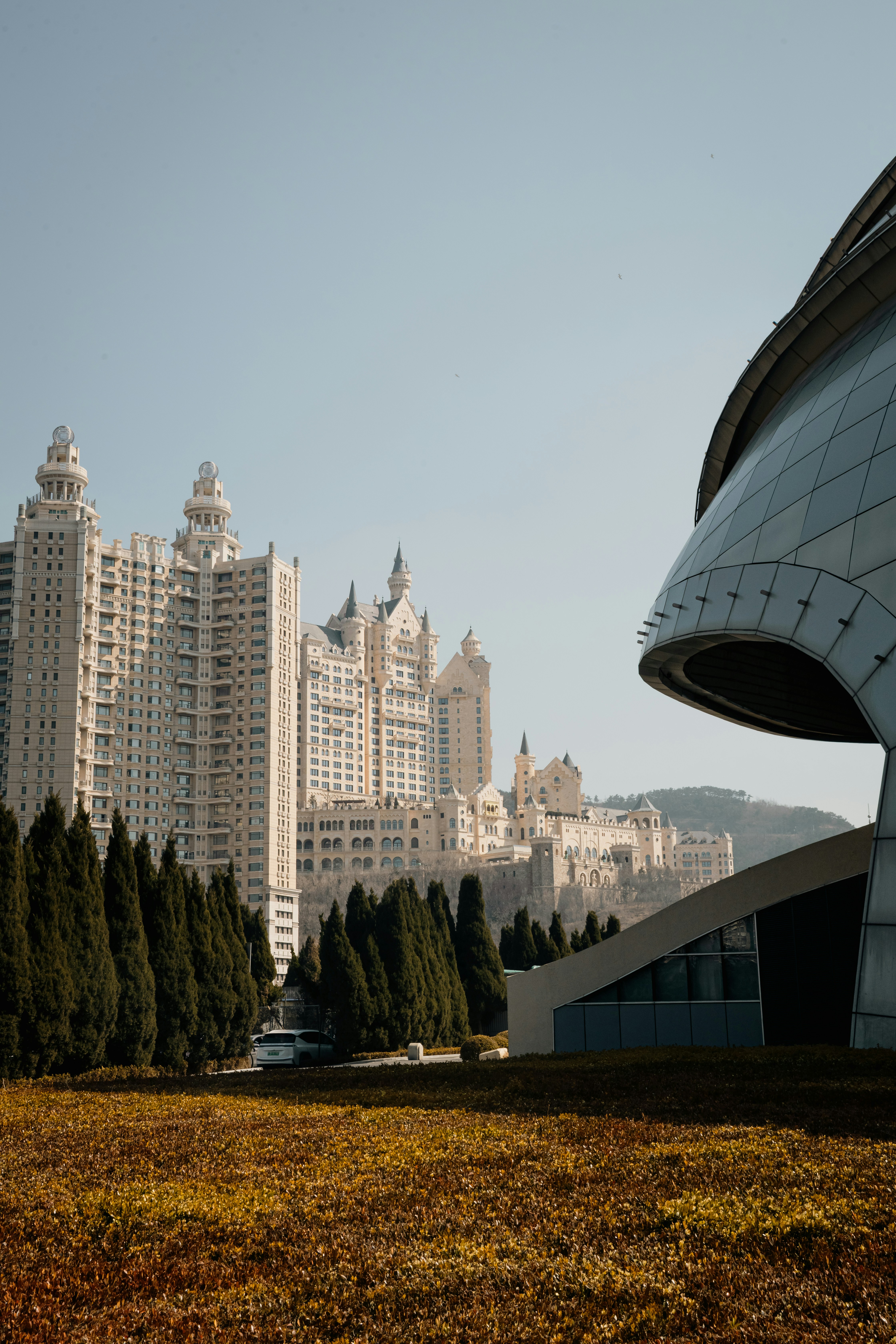 Curved Modernism Meets Classical Skyline