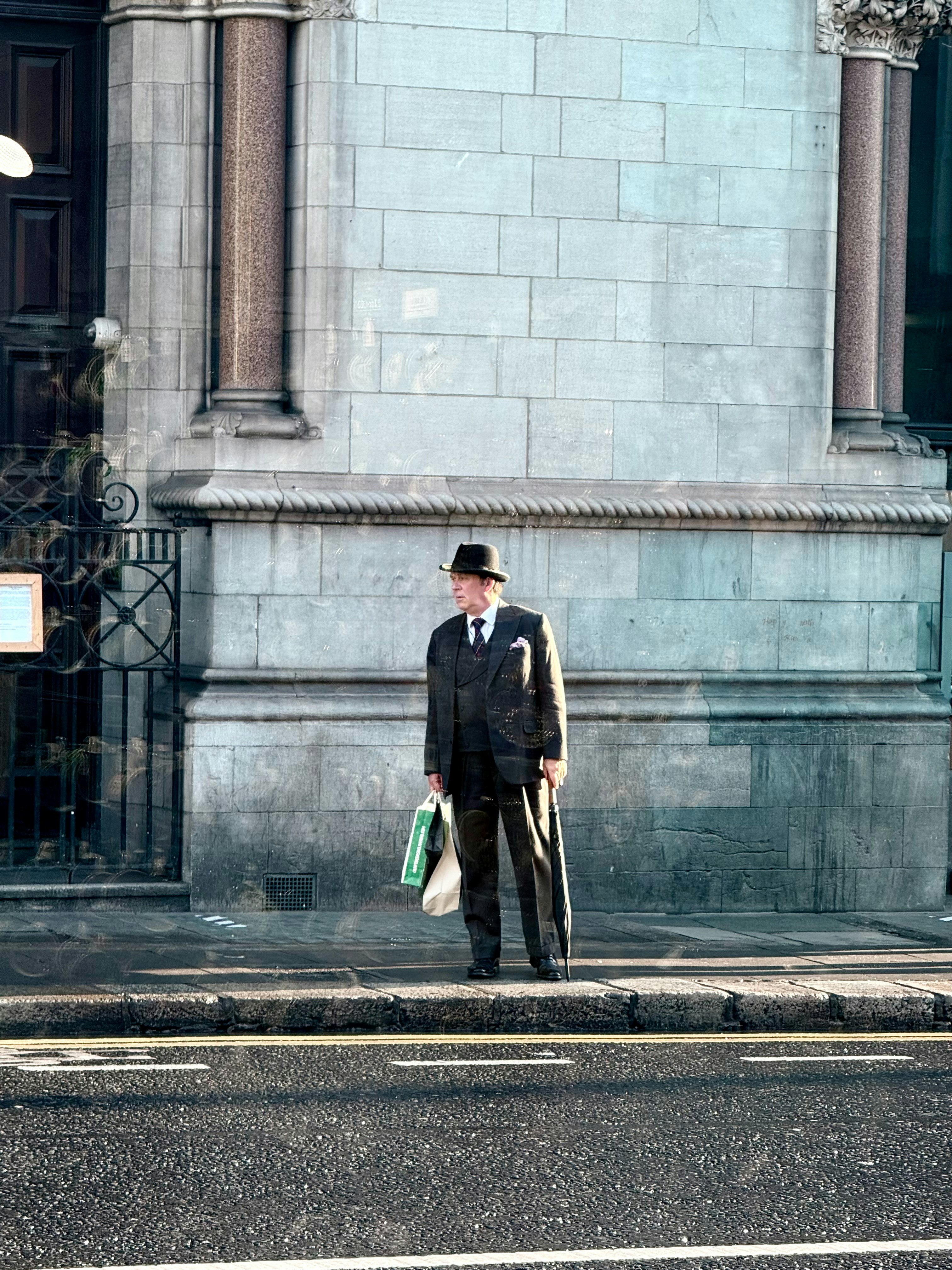 Streetwear in Antiquity: A Gentleman in a Classic Suit at the City Wall