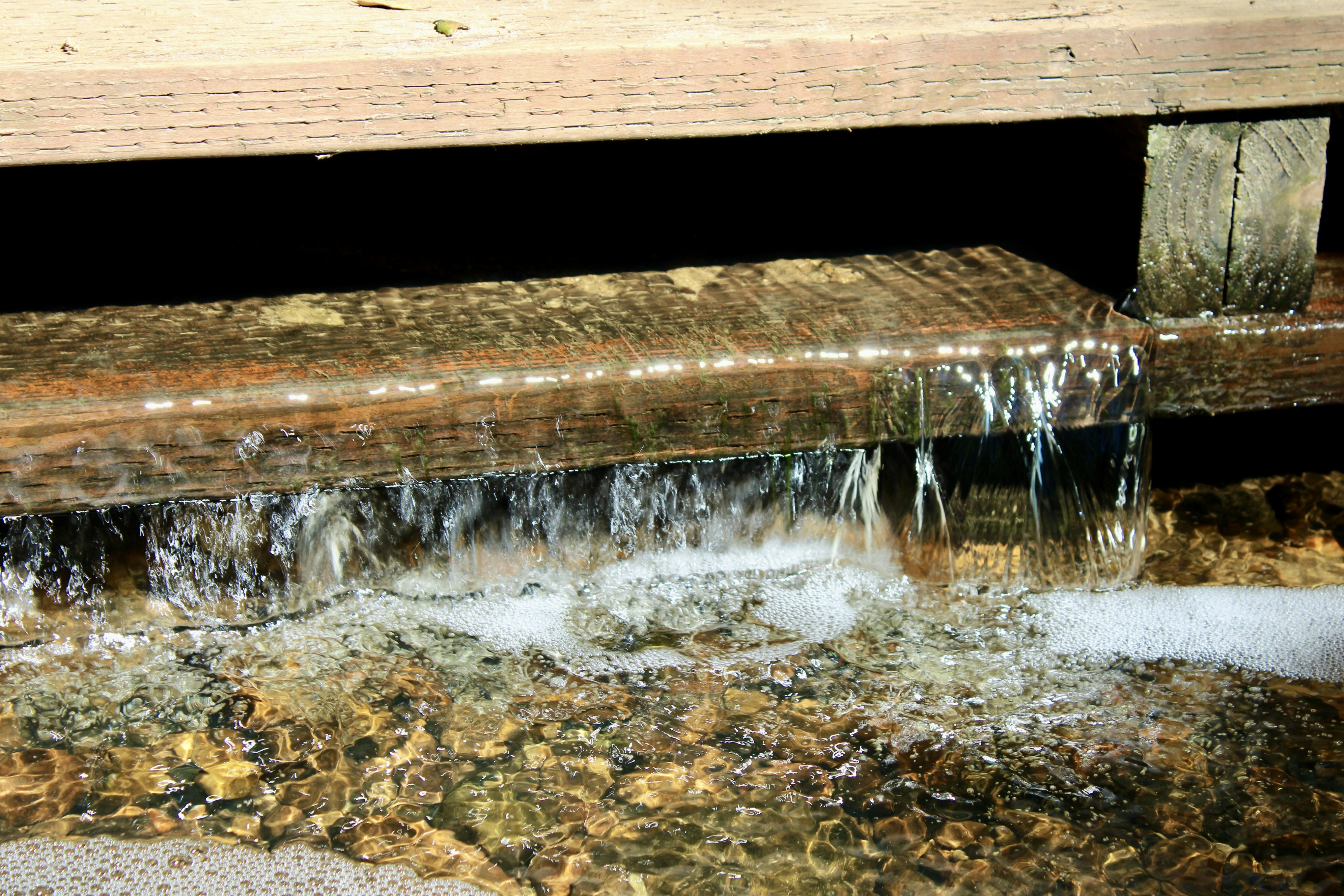 Liquid Curtain Over Weathered Wood