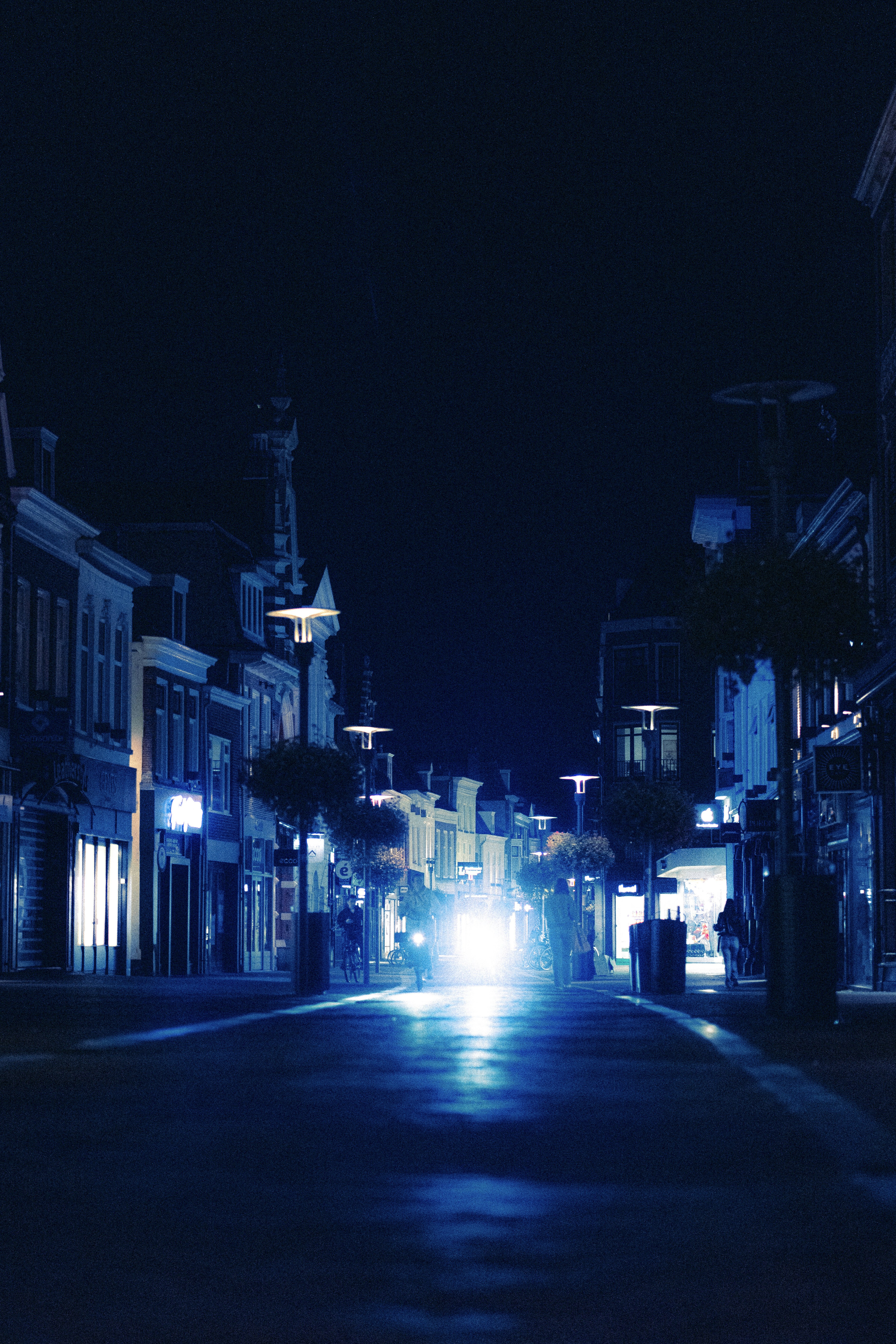 Blue Night Street: Neon Lane to the Distant Glow