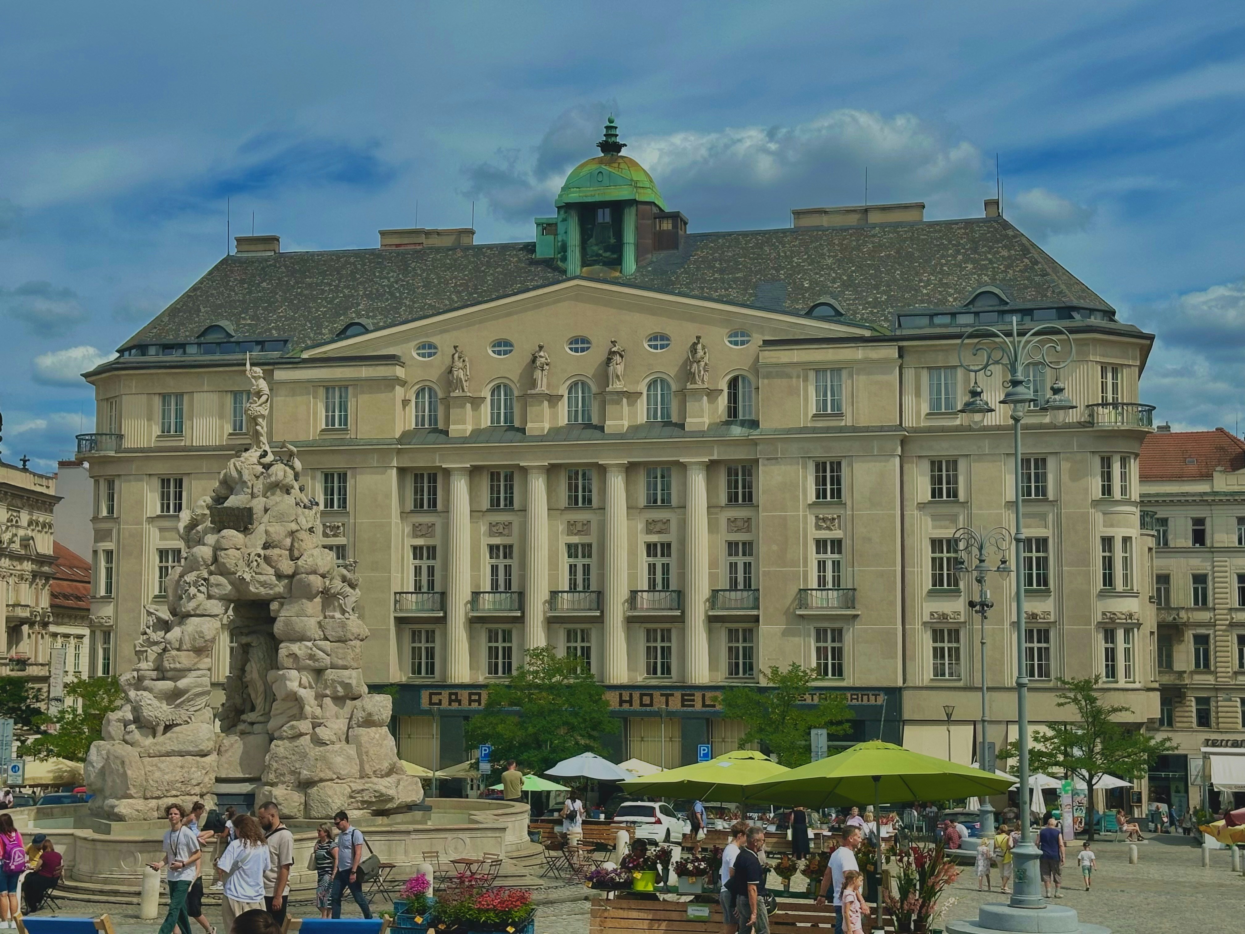 Baroque Facade and sunlit Plaza: A Central Square Awakens
