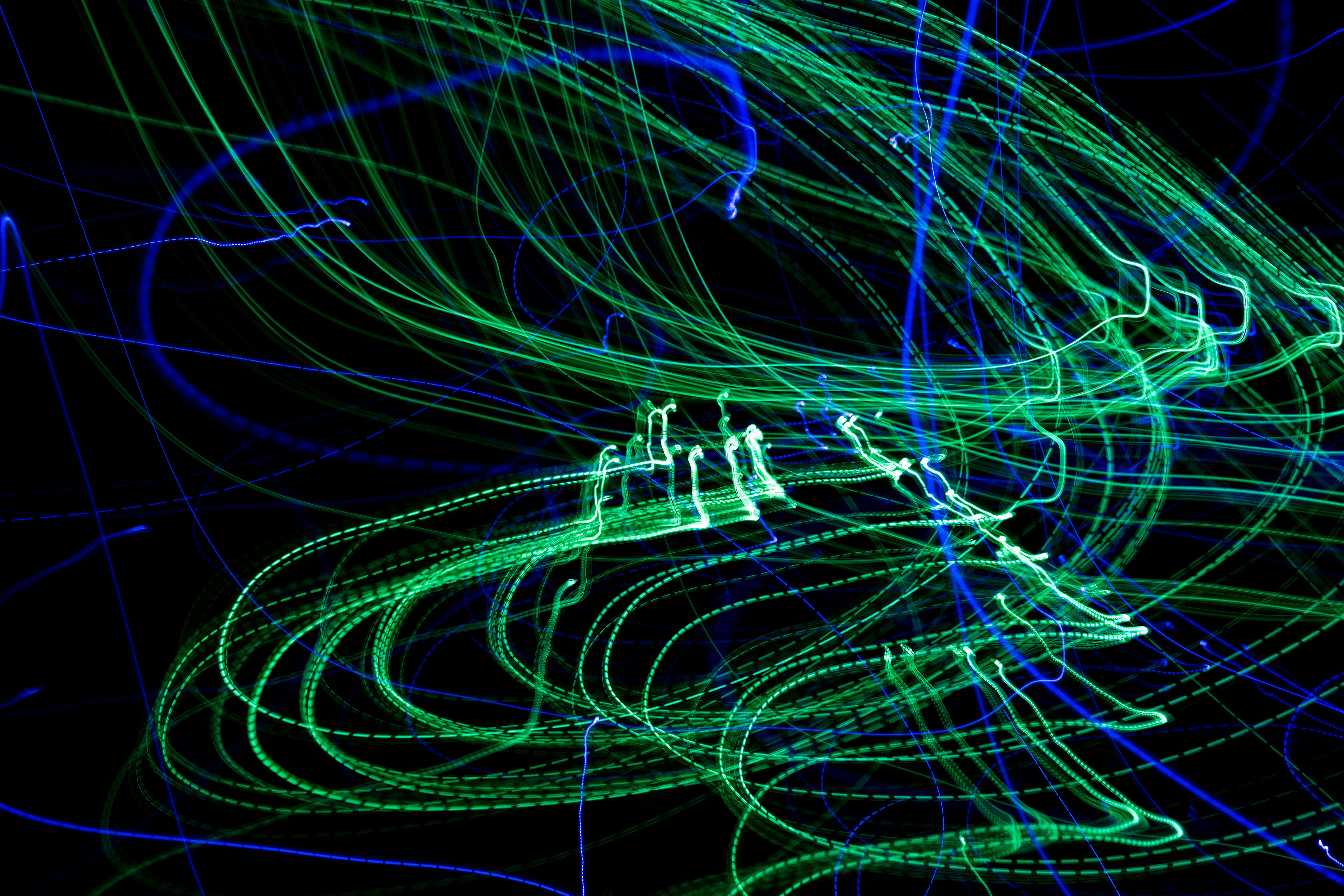  Neon Spiral Dance: Light Trails Around a Central Arc