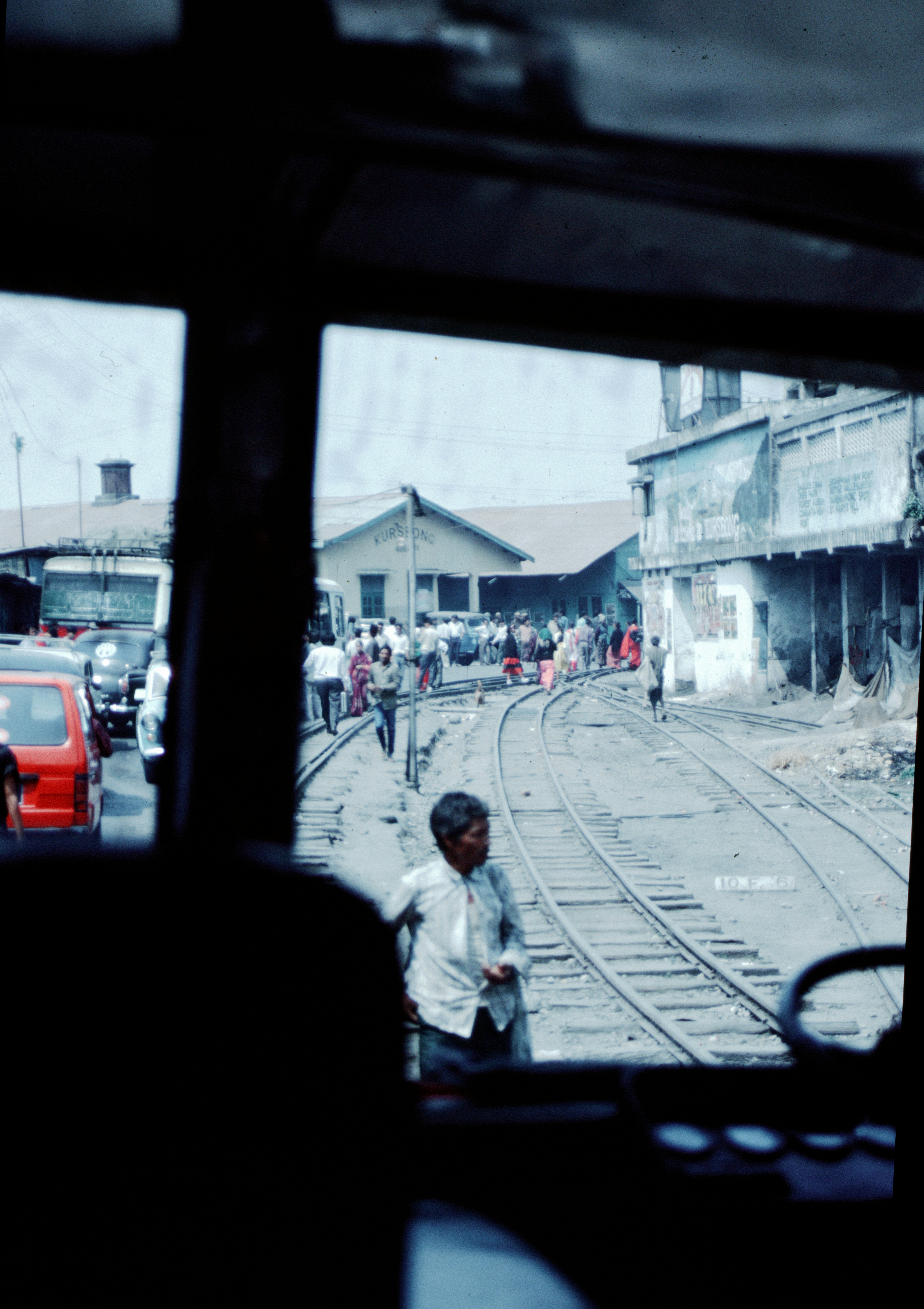 Through the Frame: Rail Yard Moments Beneath a Window Tint