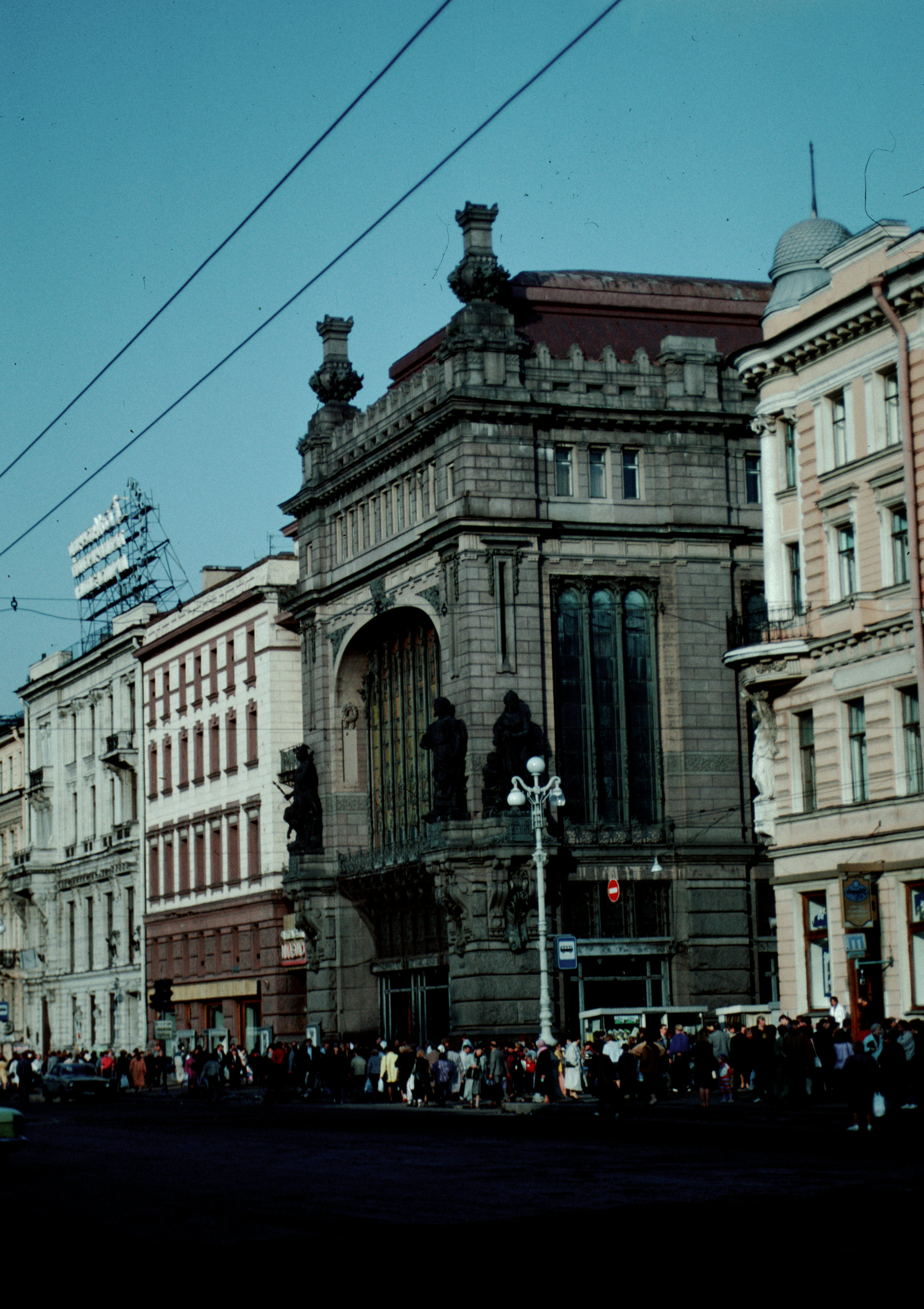 Facade of a Historic Theater Framed by a Busy Street
