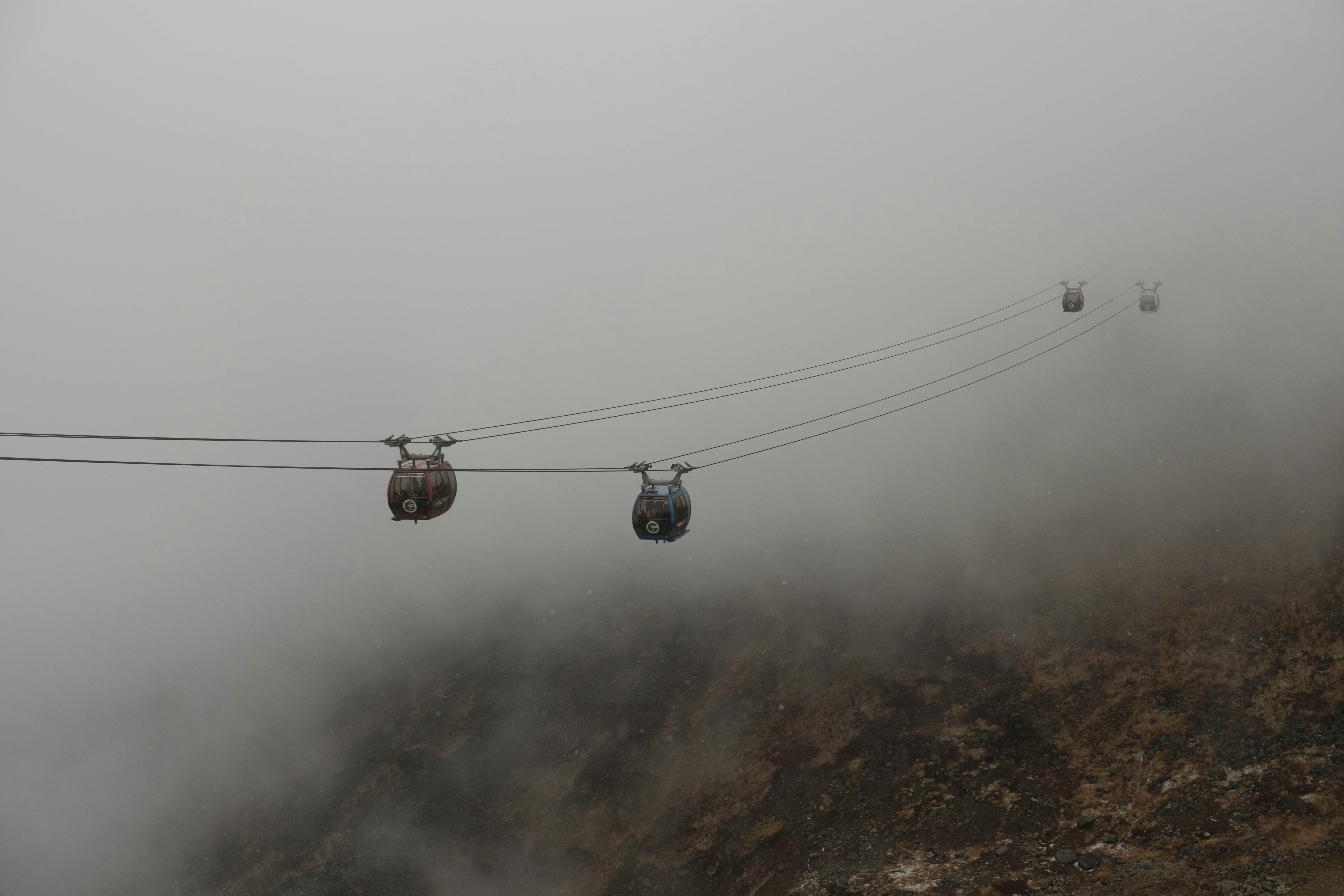 Cableway through the Mist: A Quiet Descent into the Valley