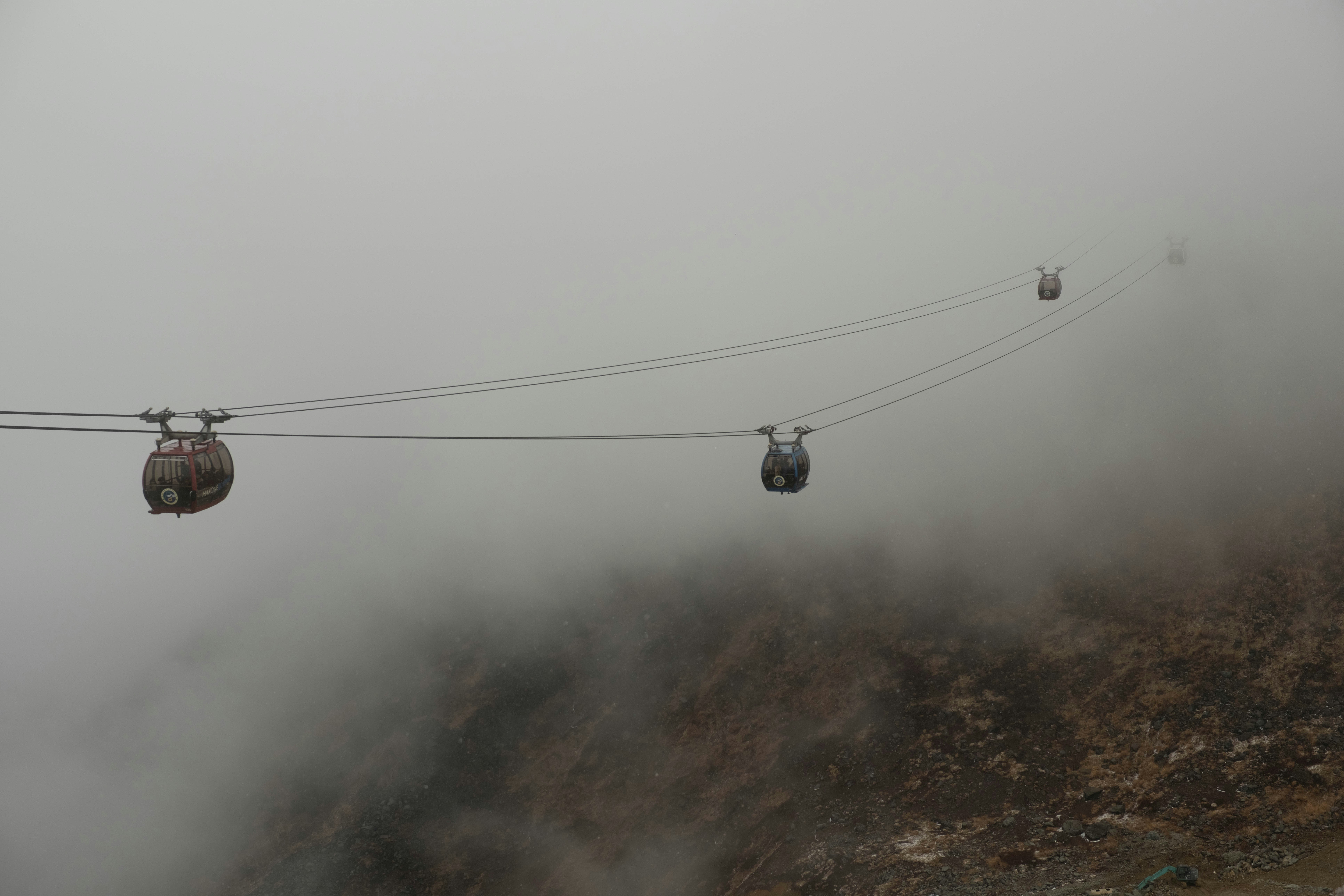 Cable Cars Carve Through Quiet Morning Mist