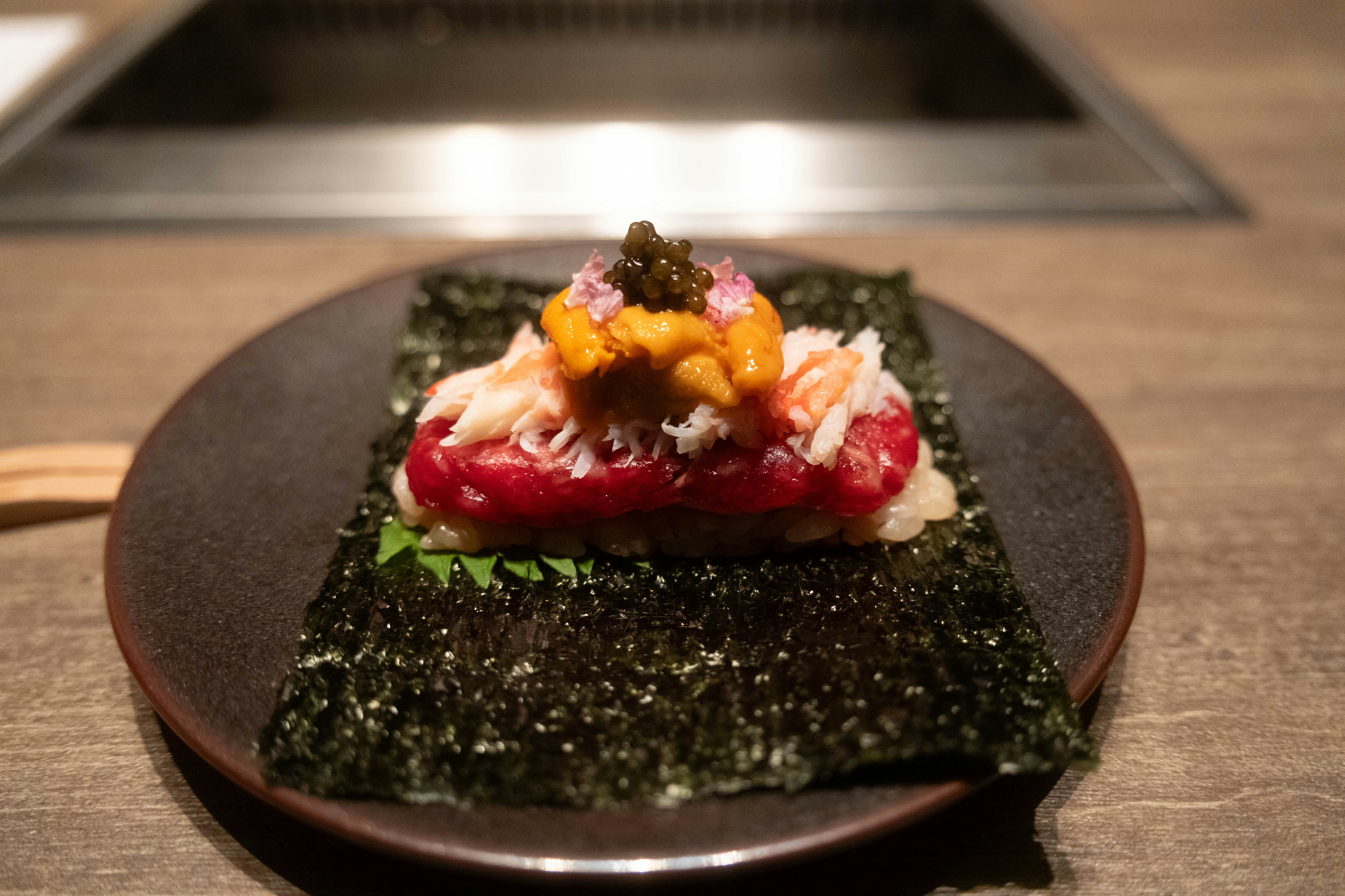 Overhand Sushi Roll on Seaweed Canvas