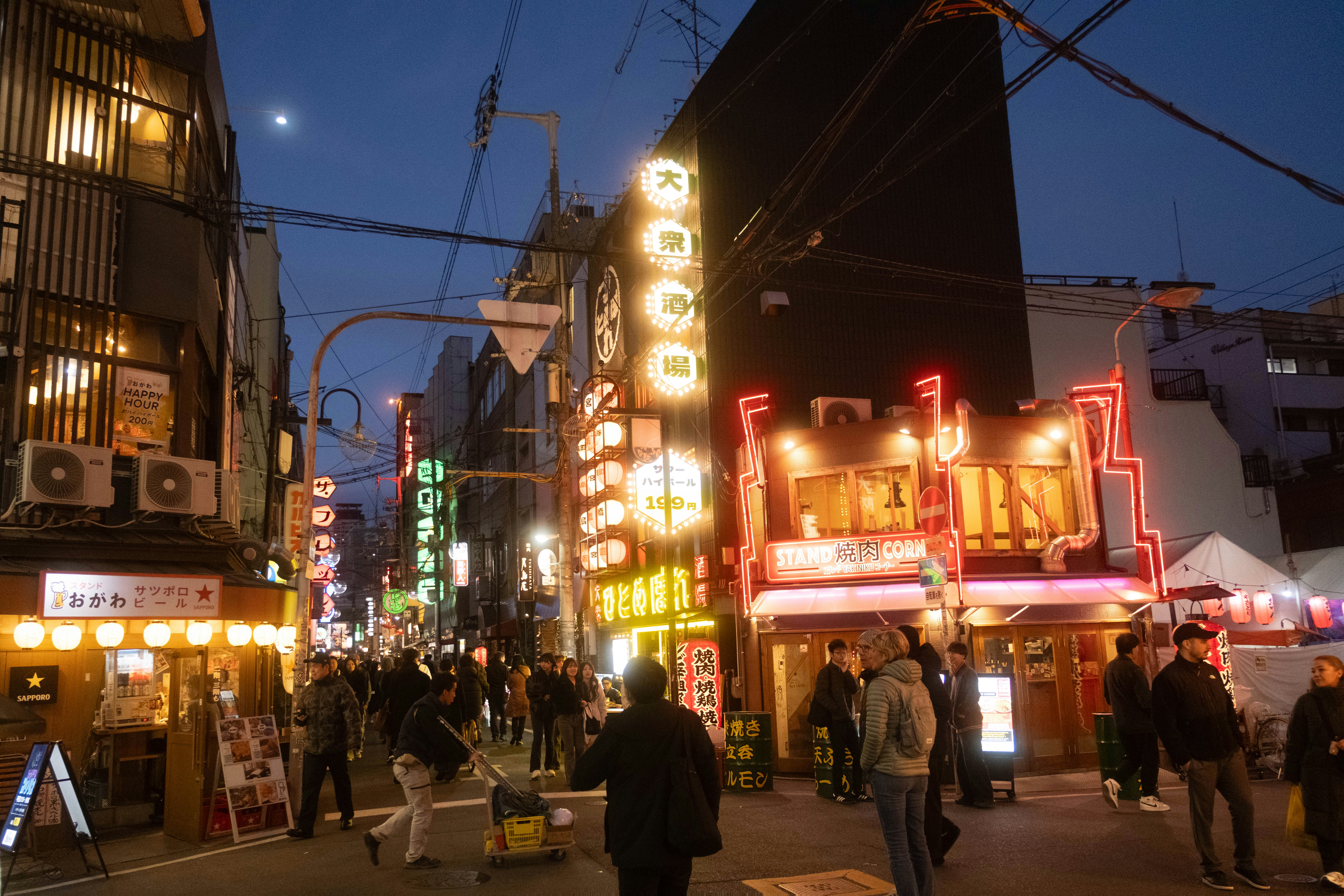 Neon Alleyway: Nightlife Pulse of a Busy Japanese Street