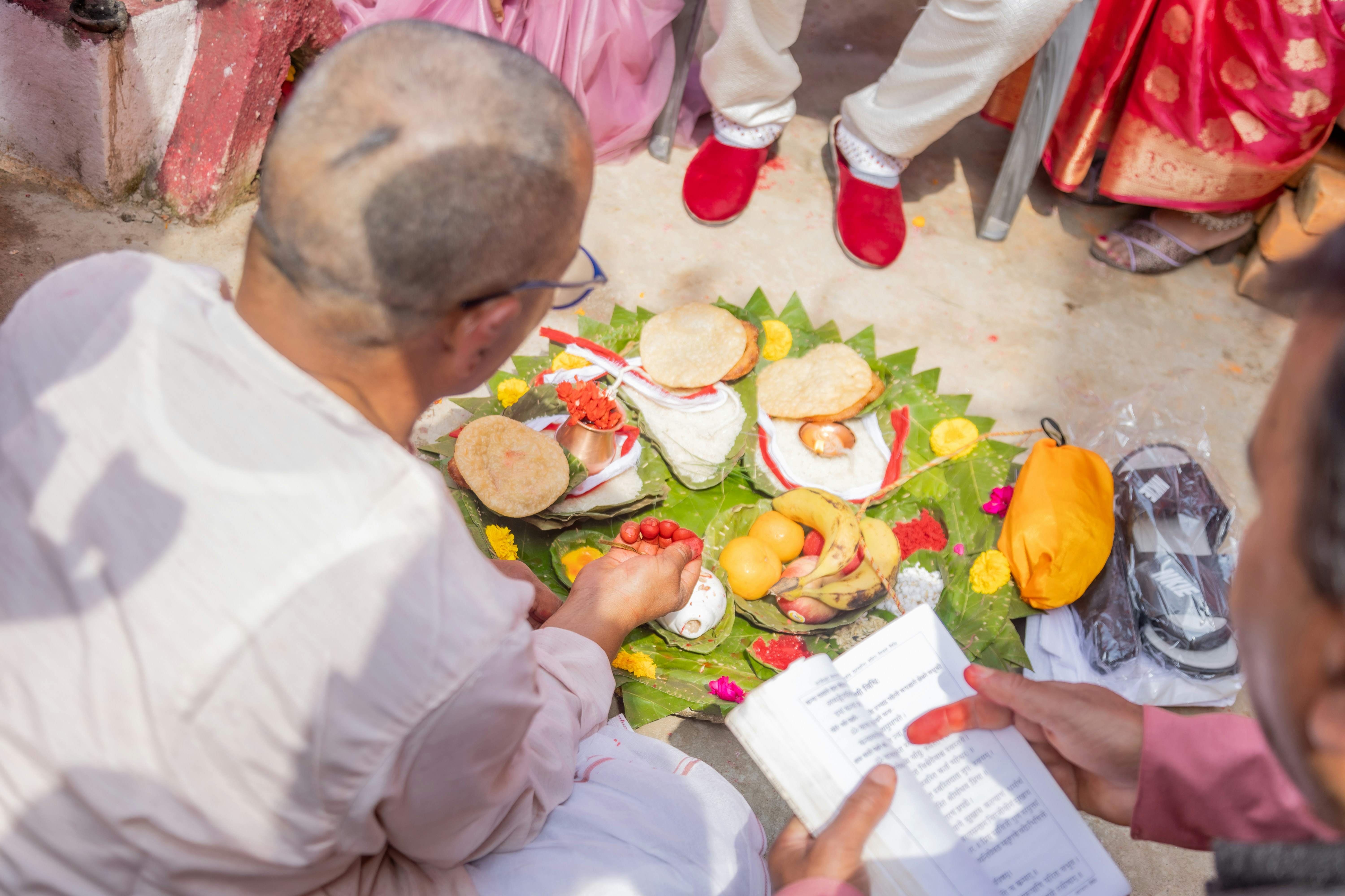 Bride’s Father Performing Pujas and Welcoming Groom | Nepali Wedding Tradition- In a Nepali wedding, the bride’s father performs pujas for the groom, warmly welcoming him into the family and presenting gifts as a token of love and blessings.