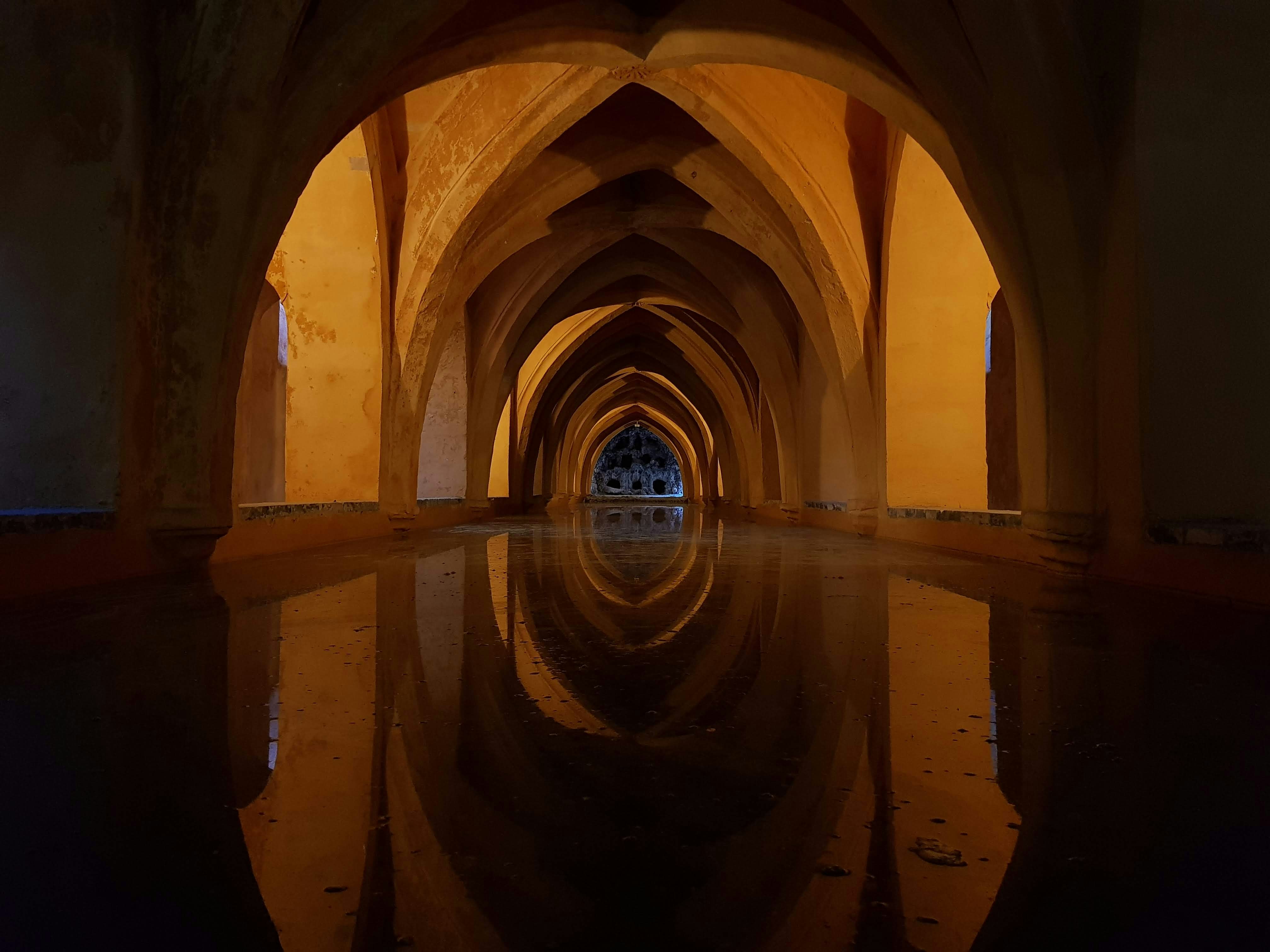 Echoes of Stone: A Vanishing Archway Reaches into Quiet Light