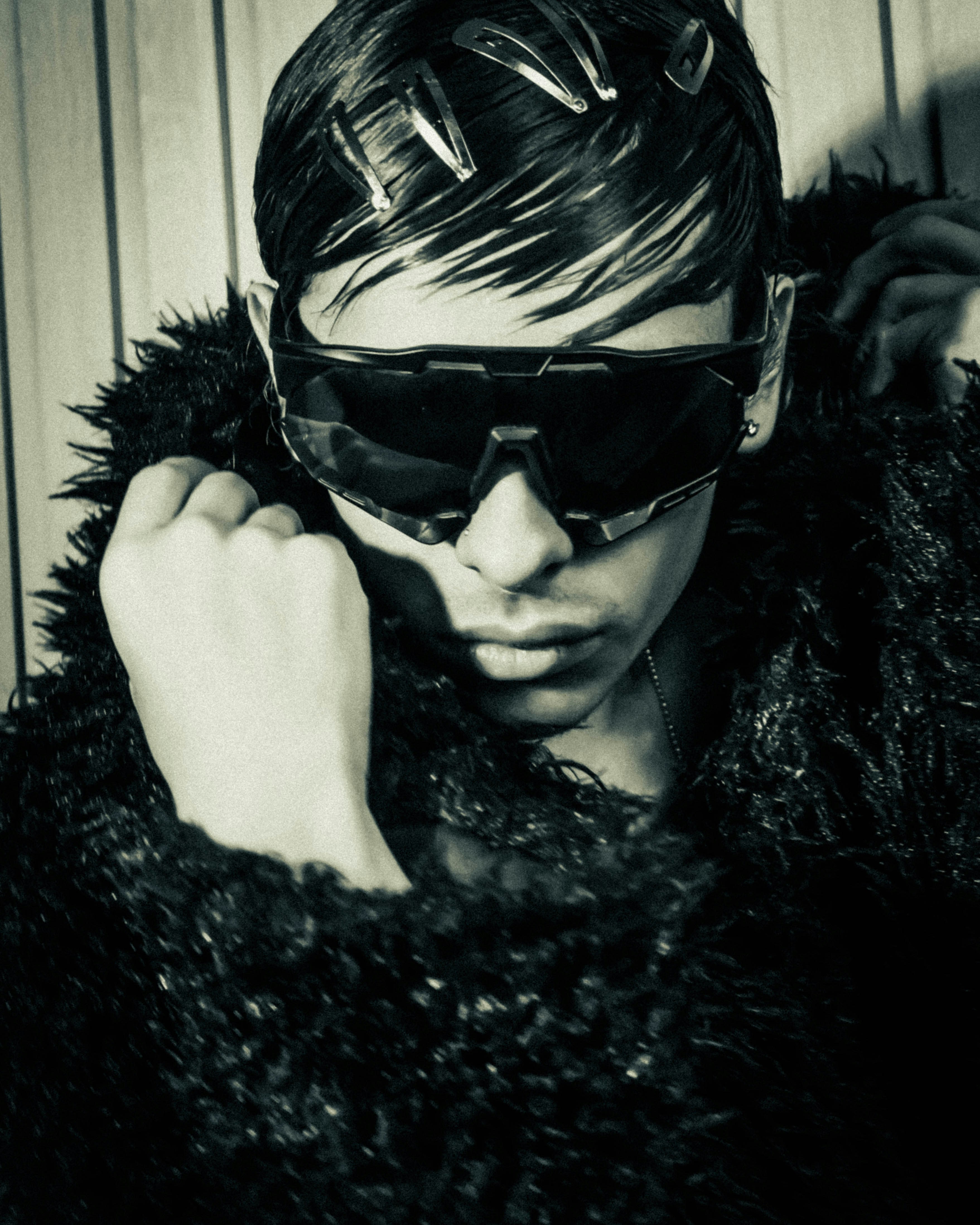 Shaded Edge: A Bold Vision in Luxe Fur and Dark Glasses