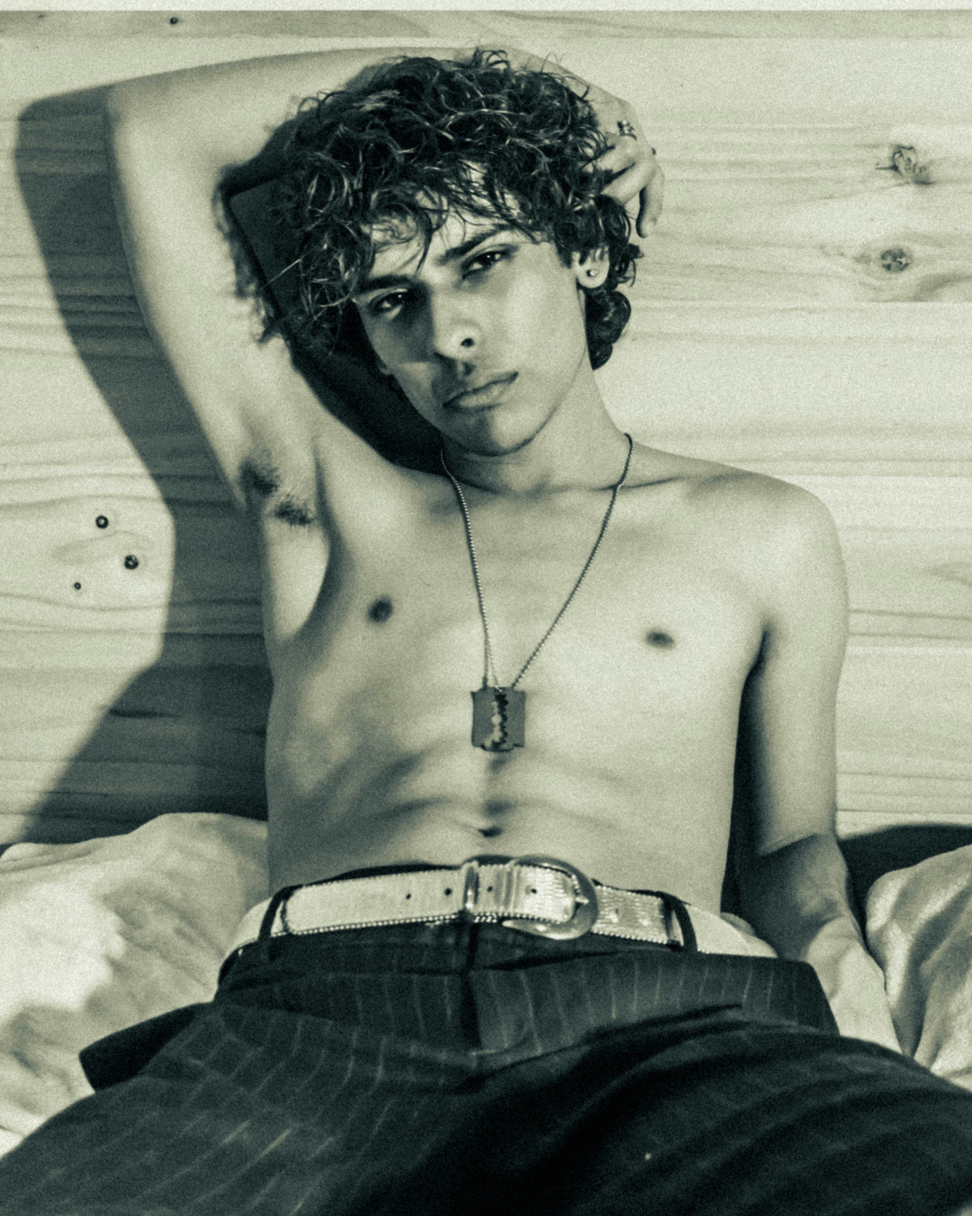 Casual Edge: A Leather-Belt Portrait in Soft Sepia