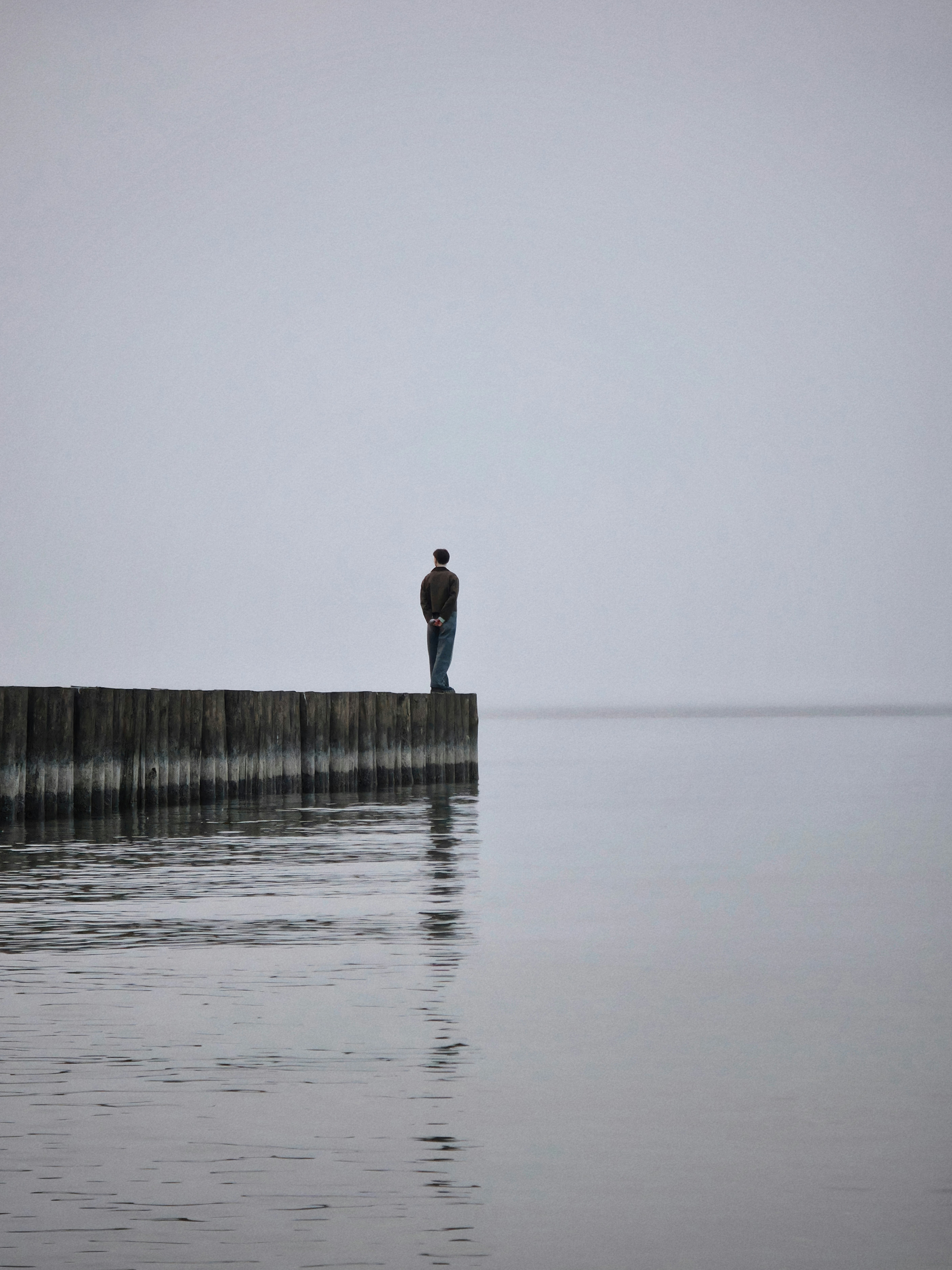 Lonely Sentinel at the Pier’s Edge
