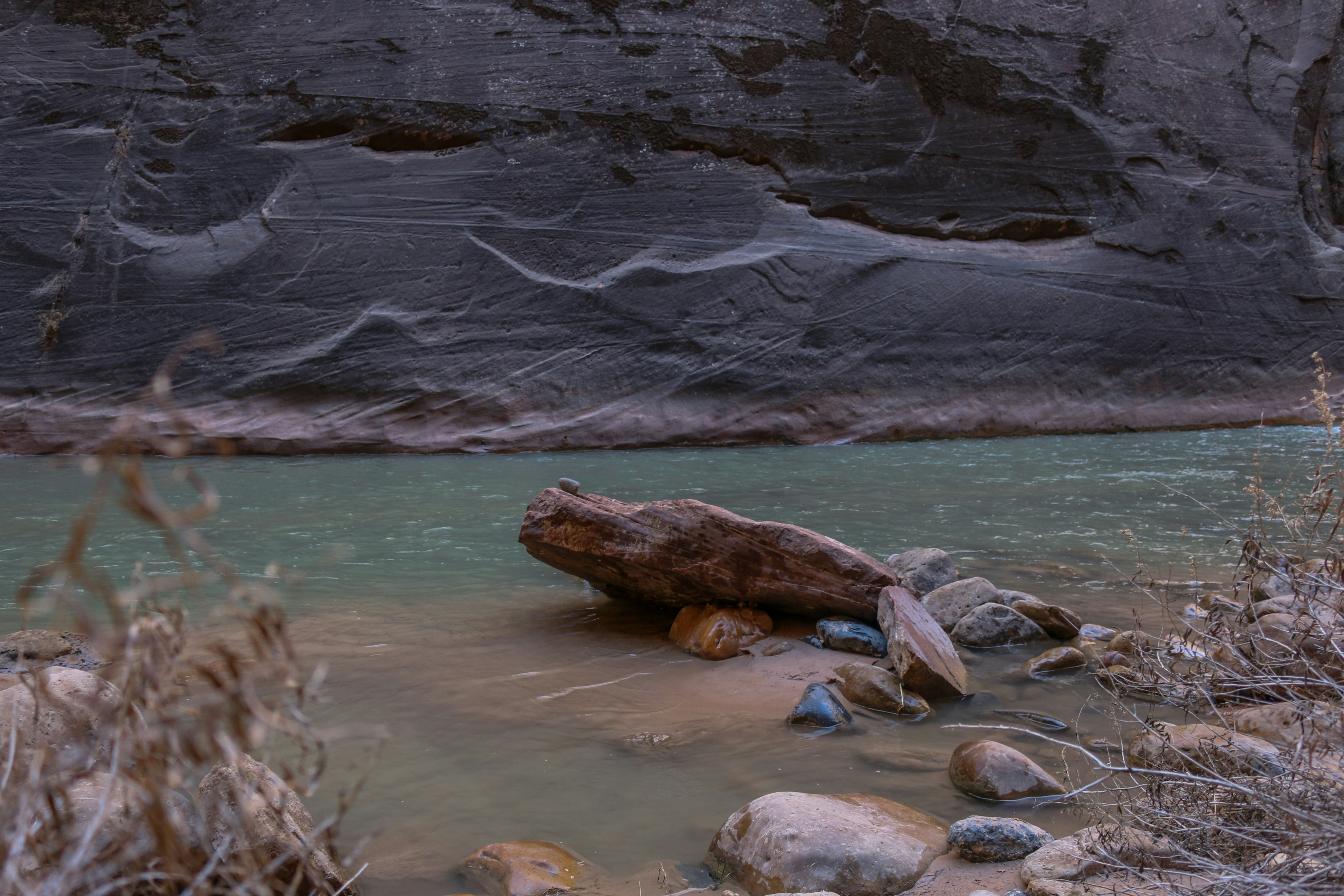 Riverstone Crossing: A Quiet Bend Beneath Weathered Cliffs