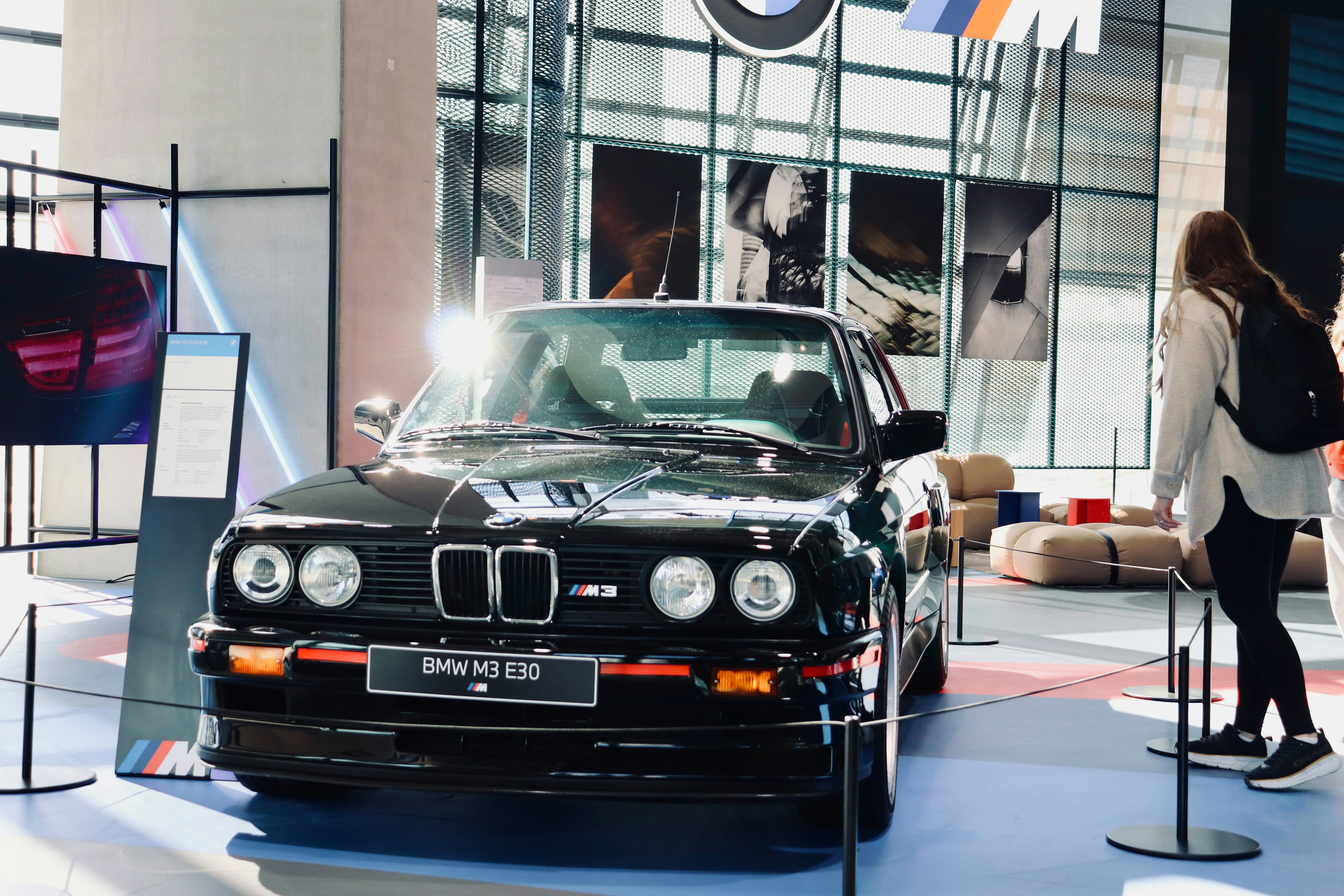 BMW E30 on Display: Classic Precision under showroom lights