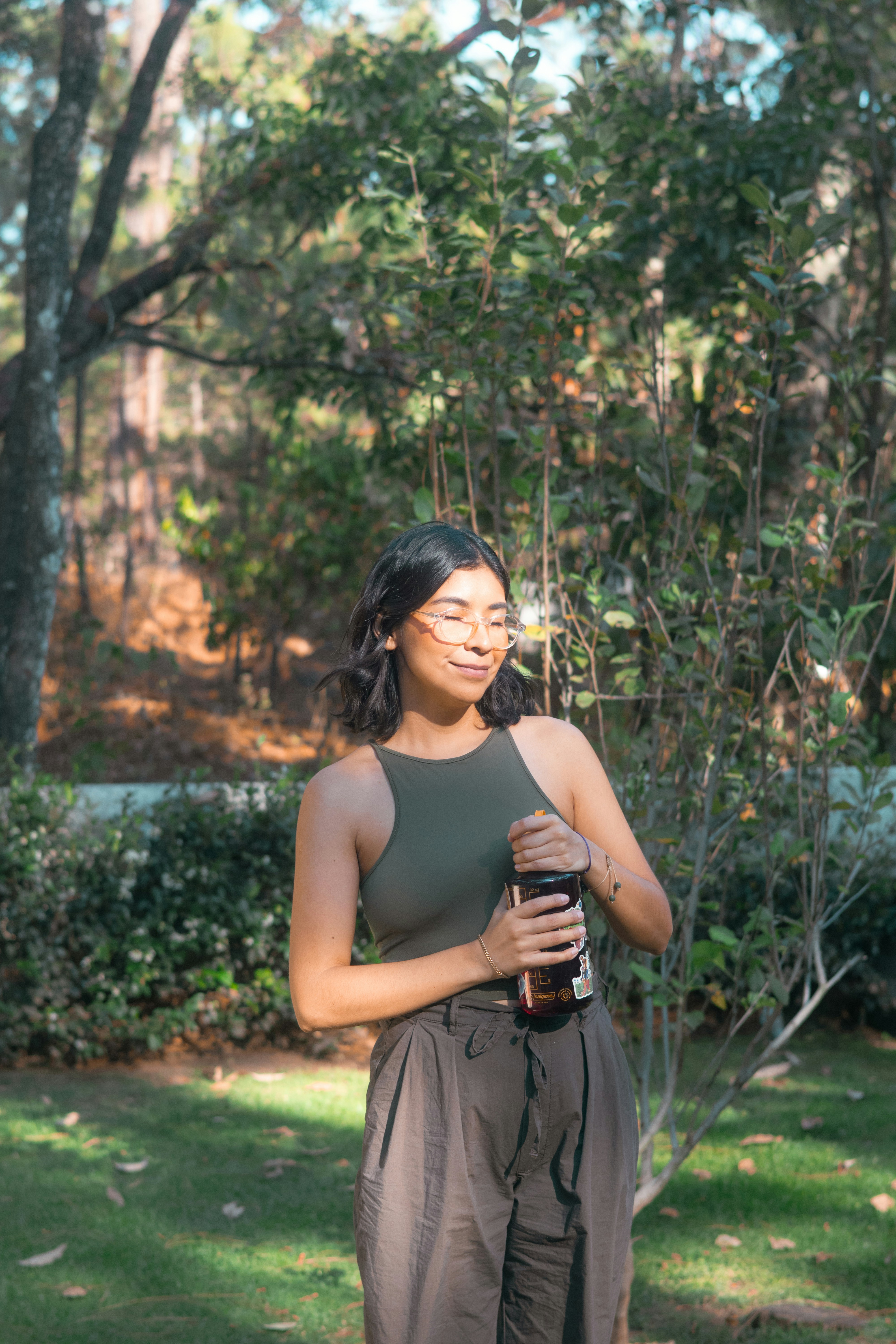 Garden Party Glow: A Quiet Moment with a Bottle