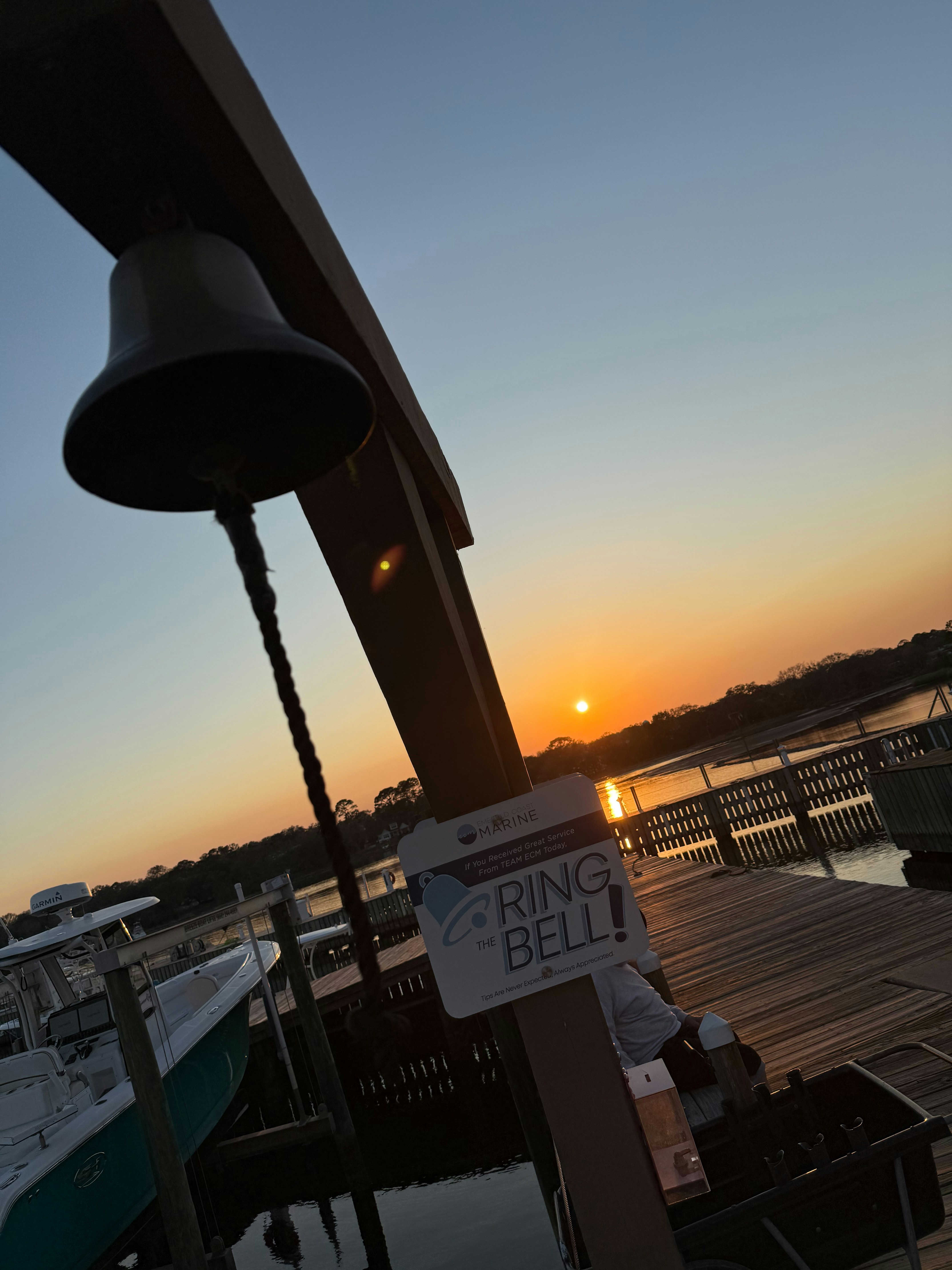 Sunset Bell at the Dock: A Quiet Moment by the Water