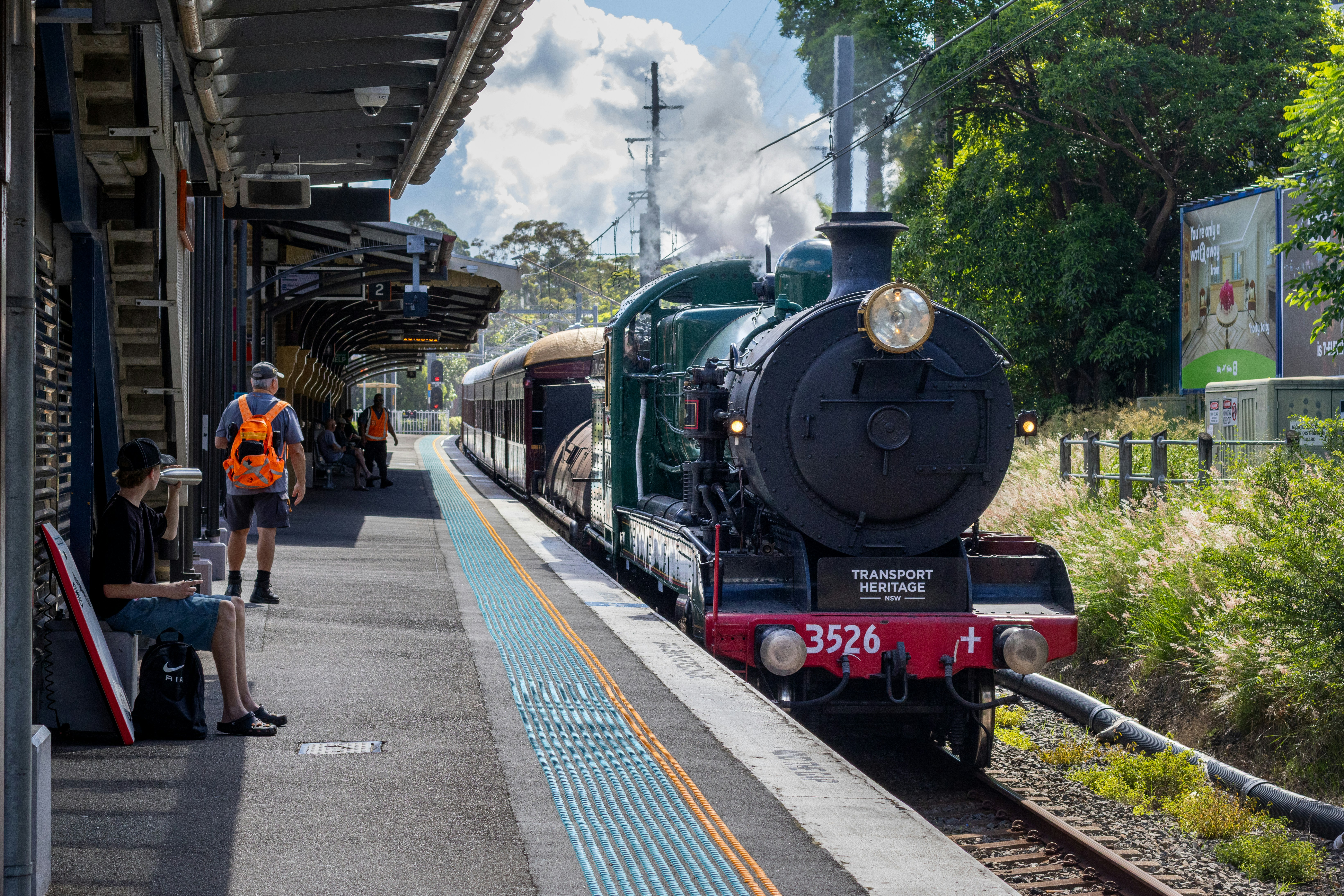 Steam and Steps: A Quiet Platform as a Historic Engine Reclaims the Track