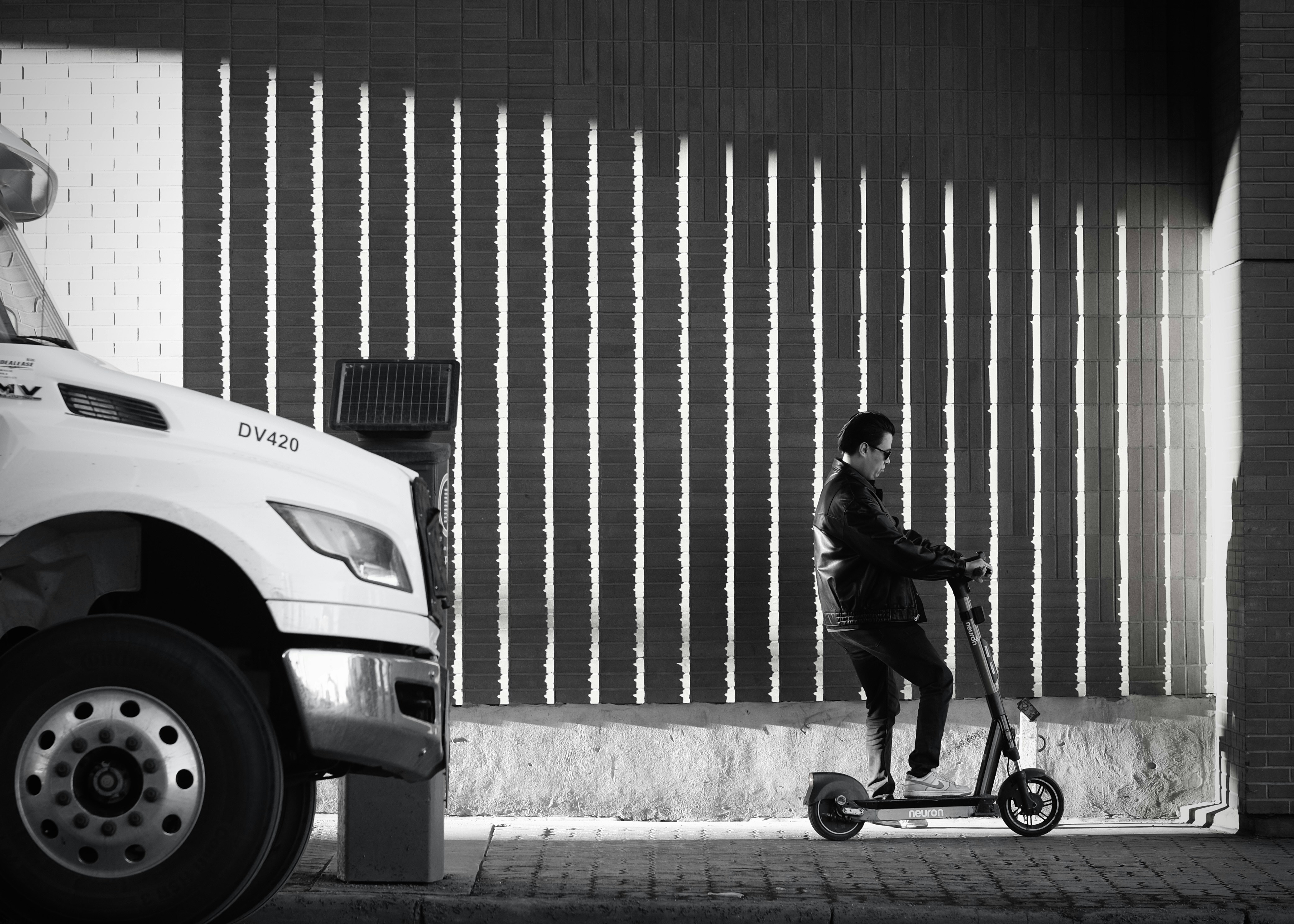Scooter Rider in a Quiet Urban Tunnel