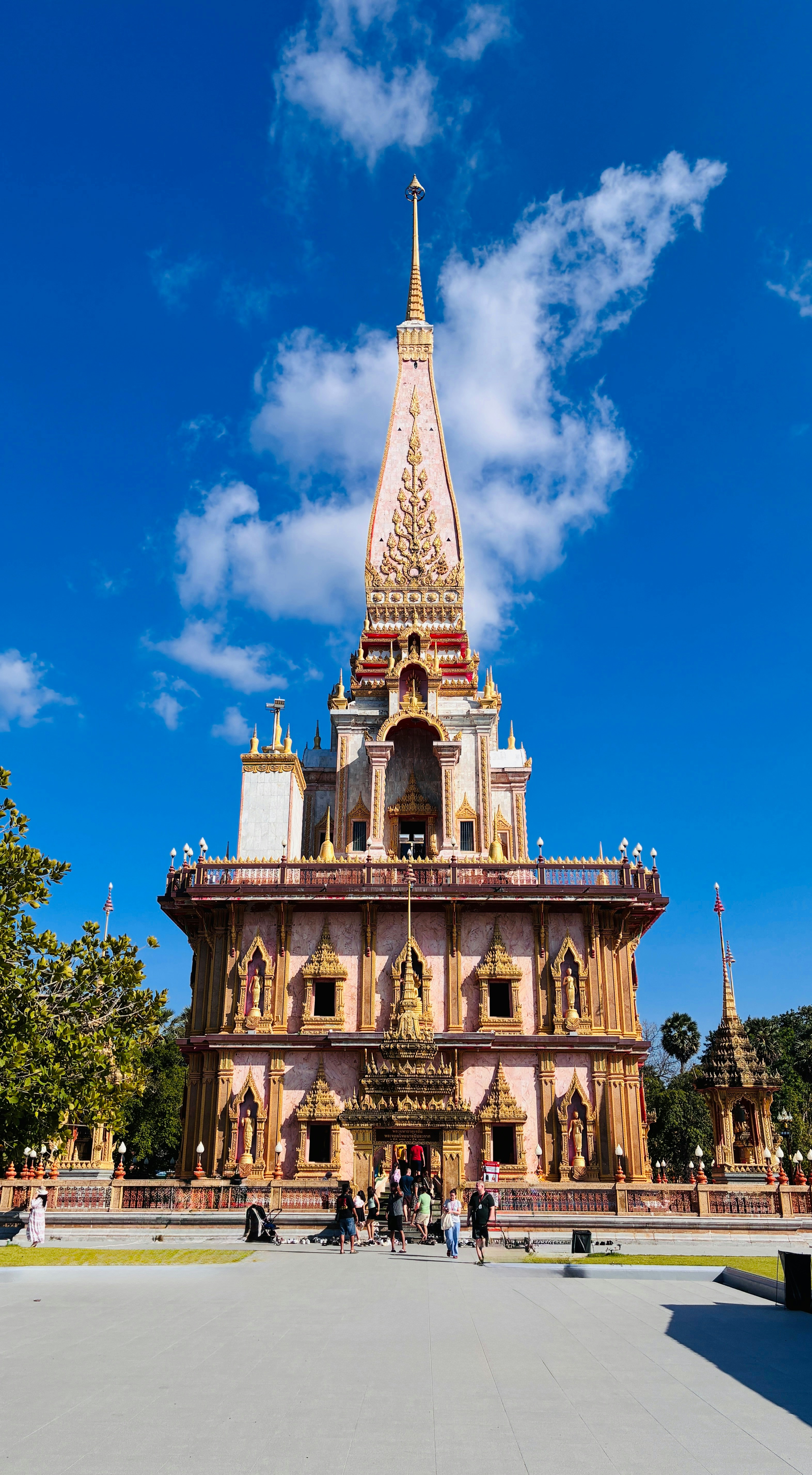 Golden Spire Reaching the Sky: Temple Tower Against a Cerulean Dome