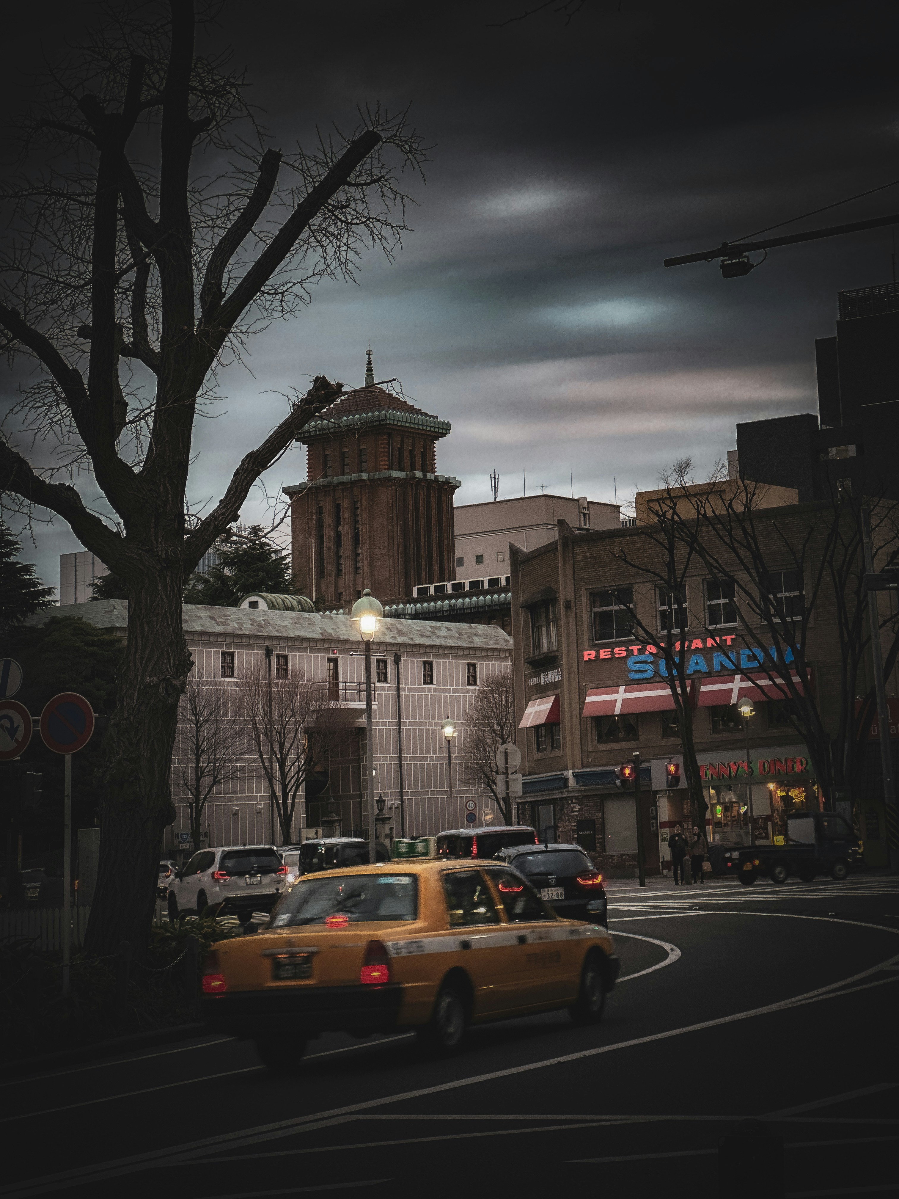 City Taxi at Dusk: Neon Signs Meet a Cedar Street Skyline
