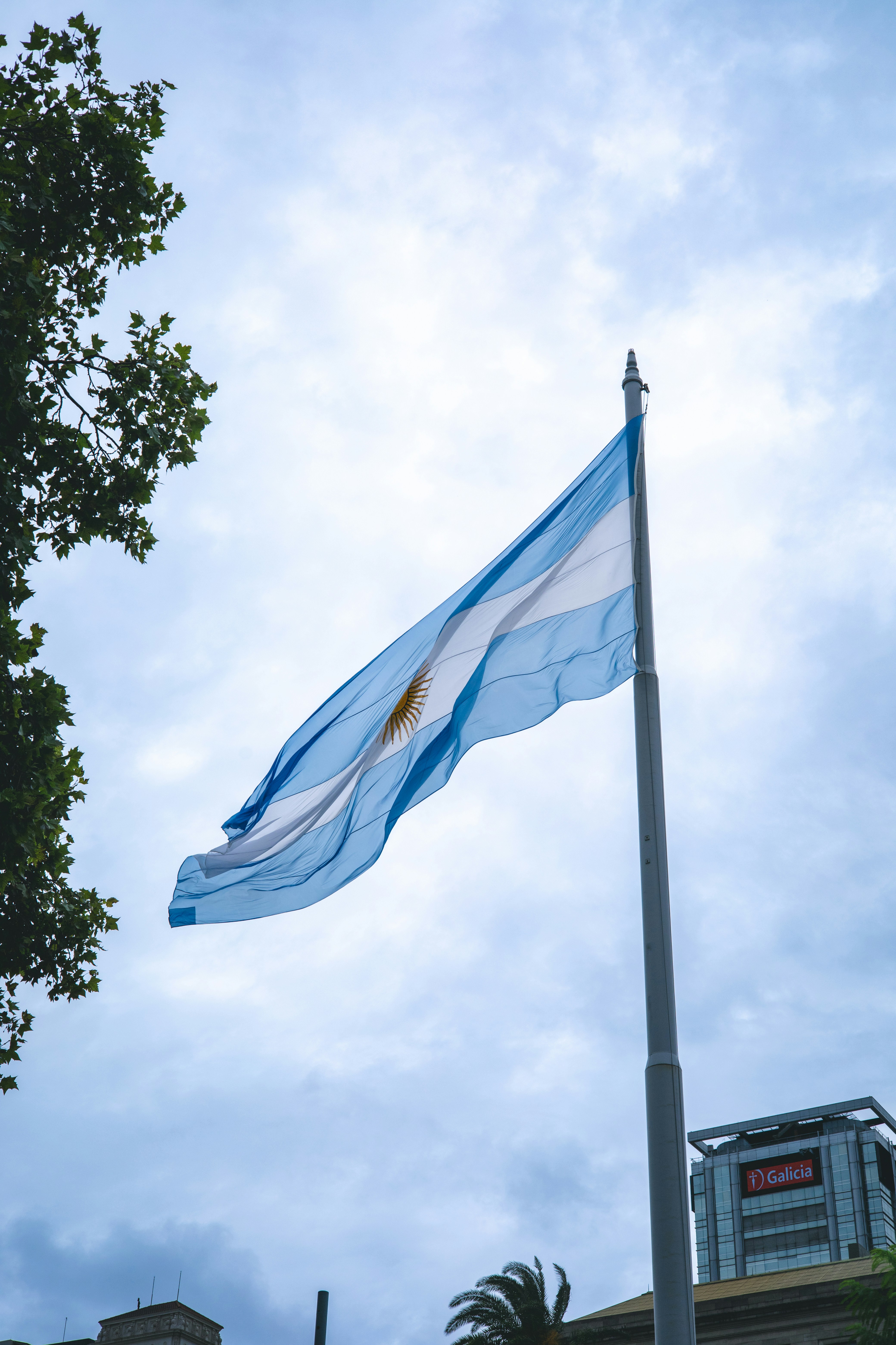 Flag in the Sky: Argentina’s Emblem Flows Over an Urban Square