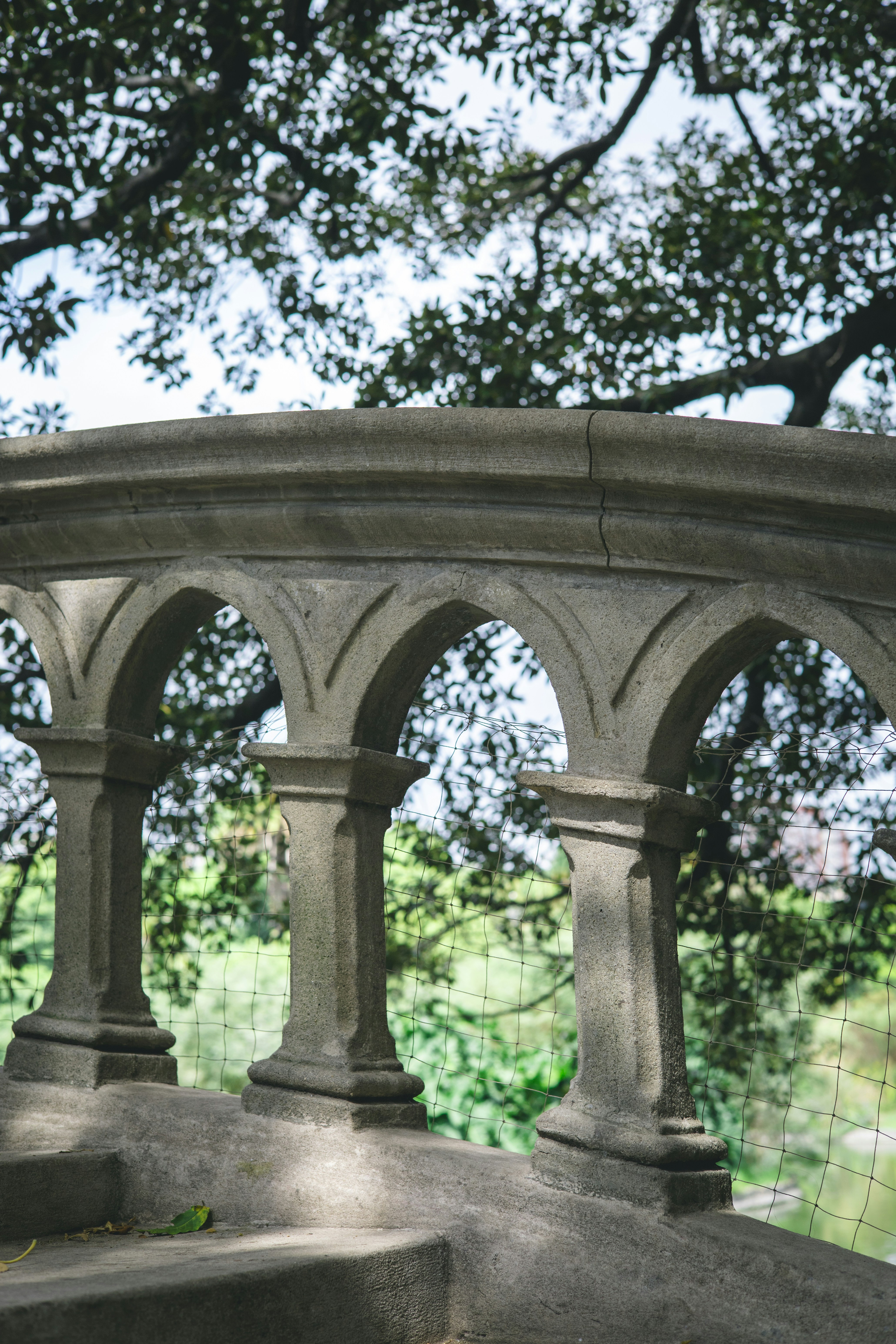Stone Arcade Overlooking a Lush Valley