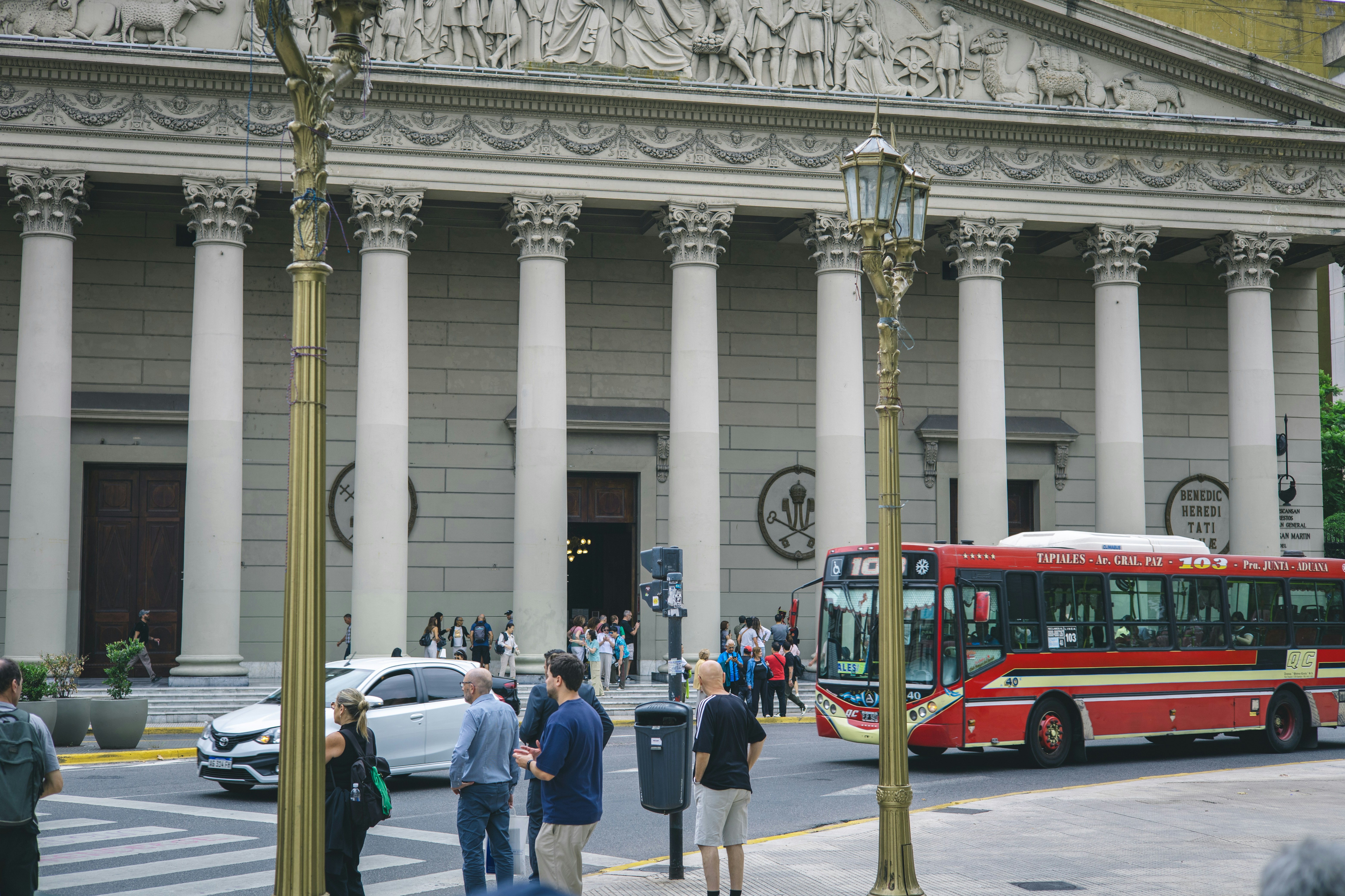 Pedestrian Crossing in Front of a Historic Colonnade