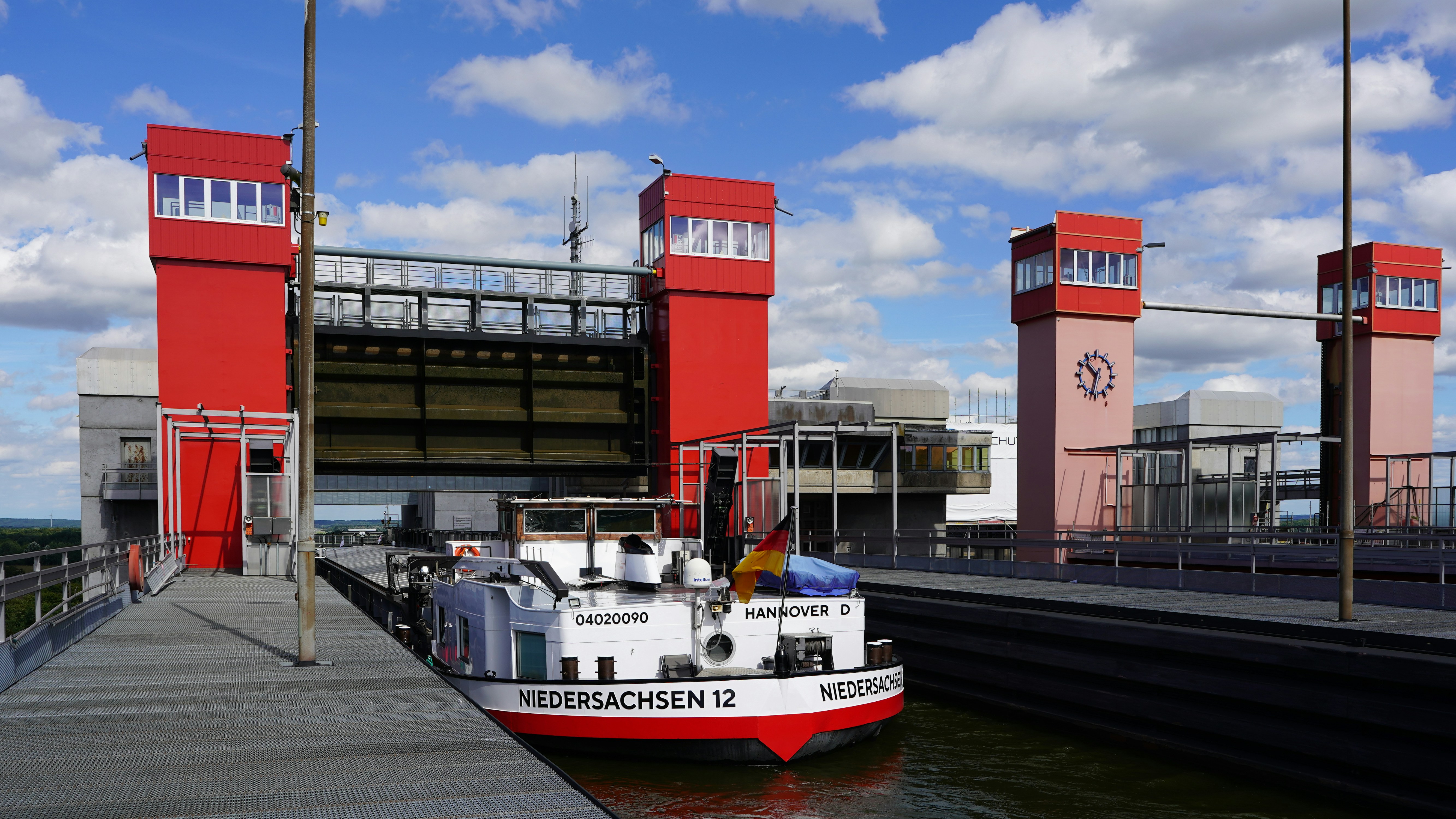 Dockside Gateway: The Red Towers and the Boat Named Niedersächsien