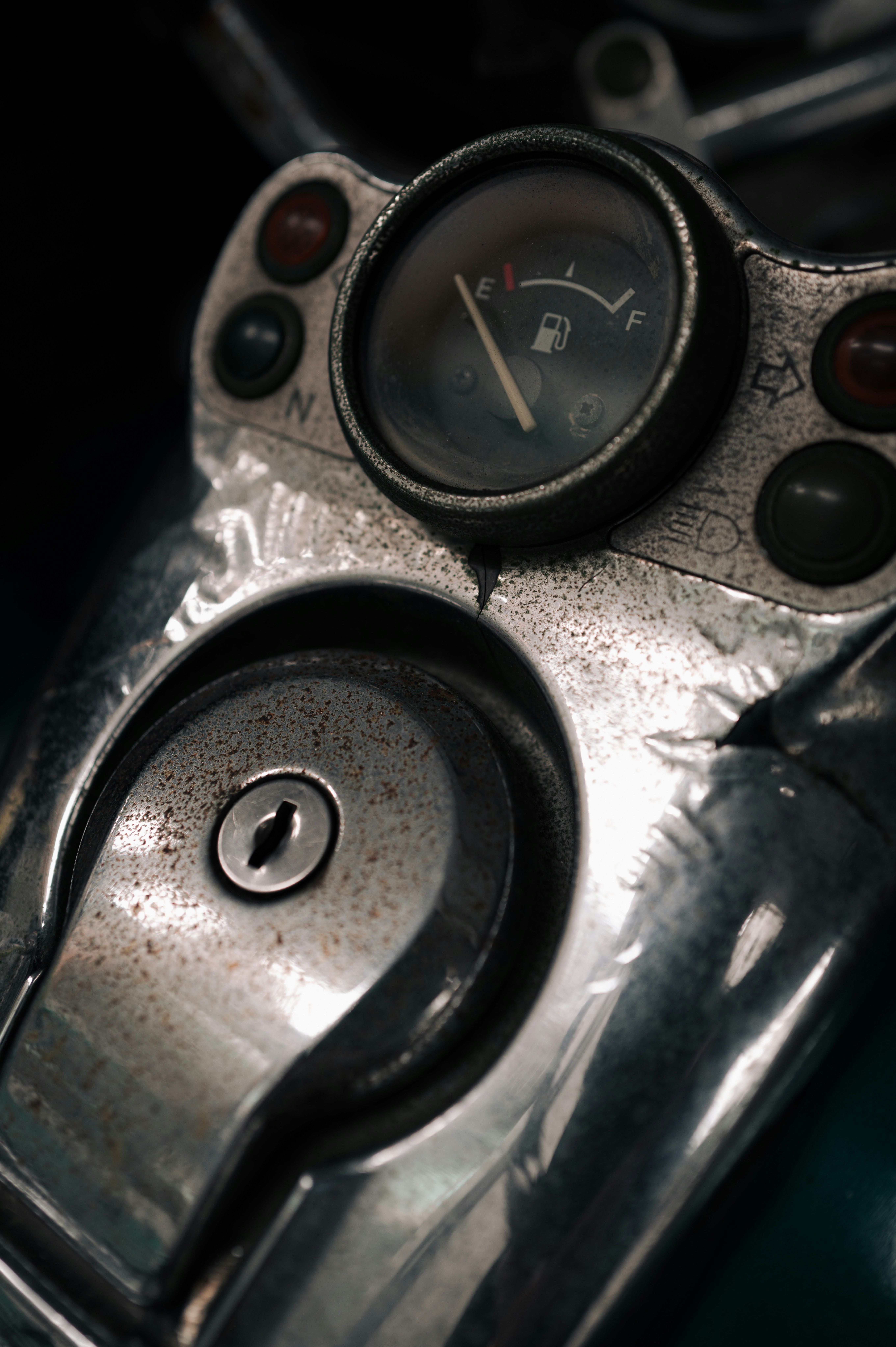 Dusty Mint: A Weathered Motorcycle Console Reclaims Its Quiet Glow