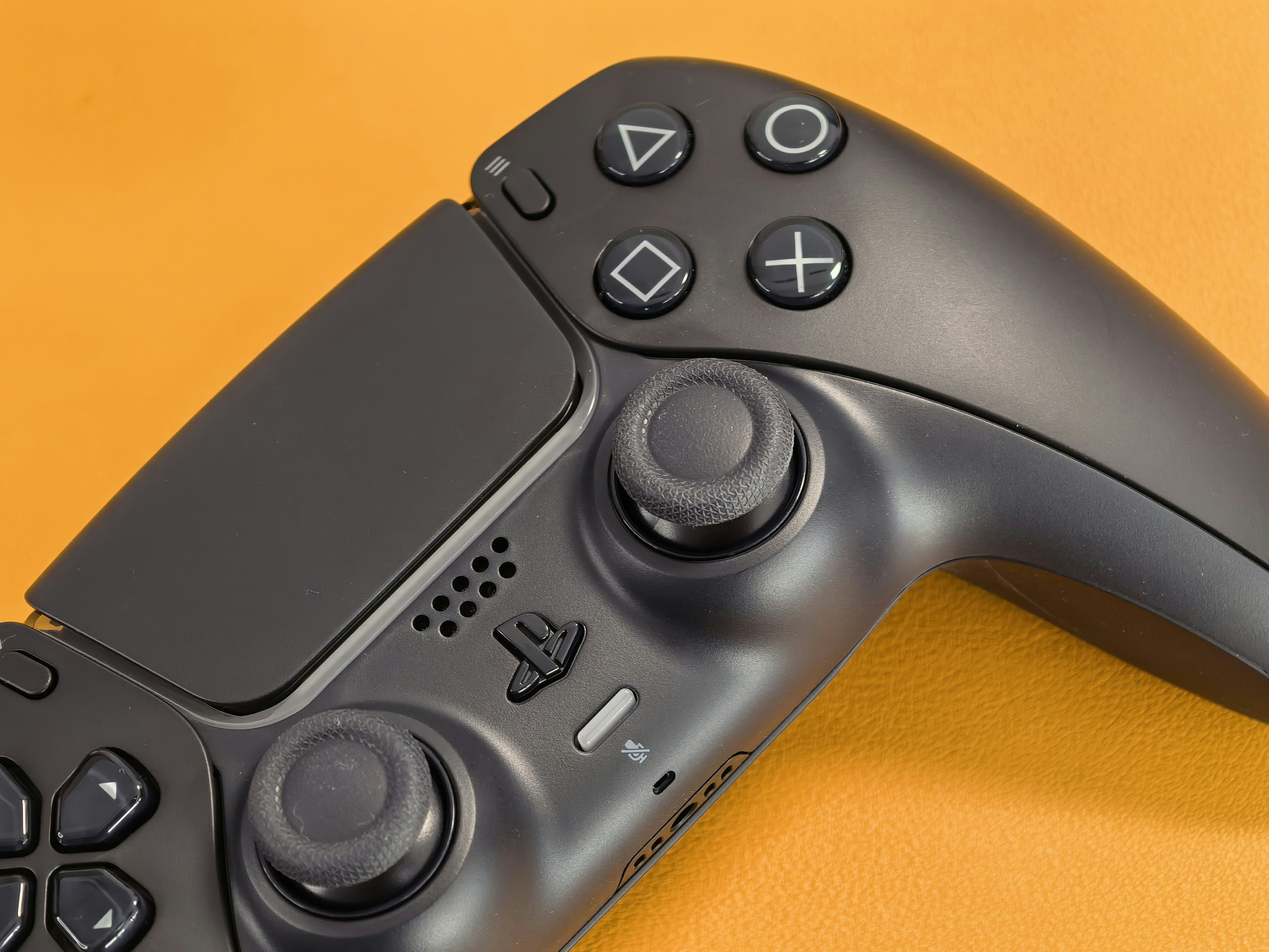 Close-Up of a Modern Game Controller: Subtle Textures and Buttons in Focus