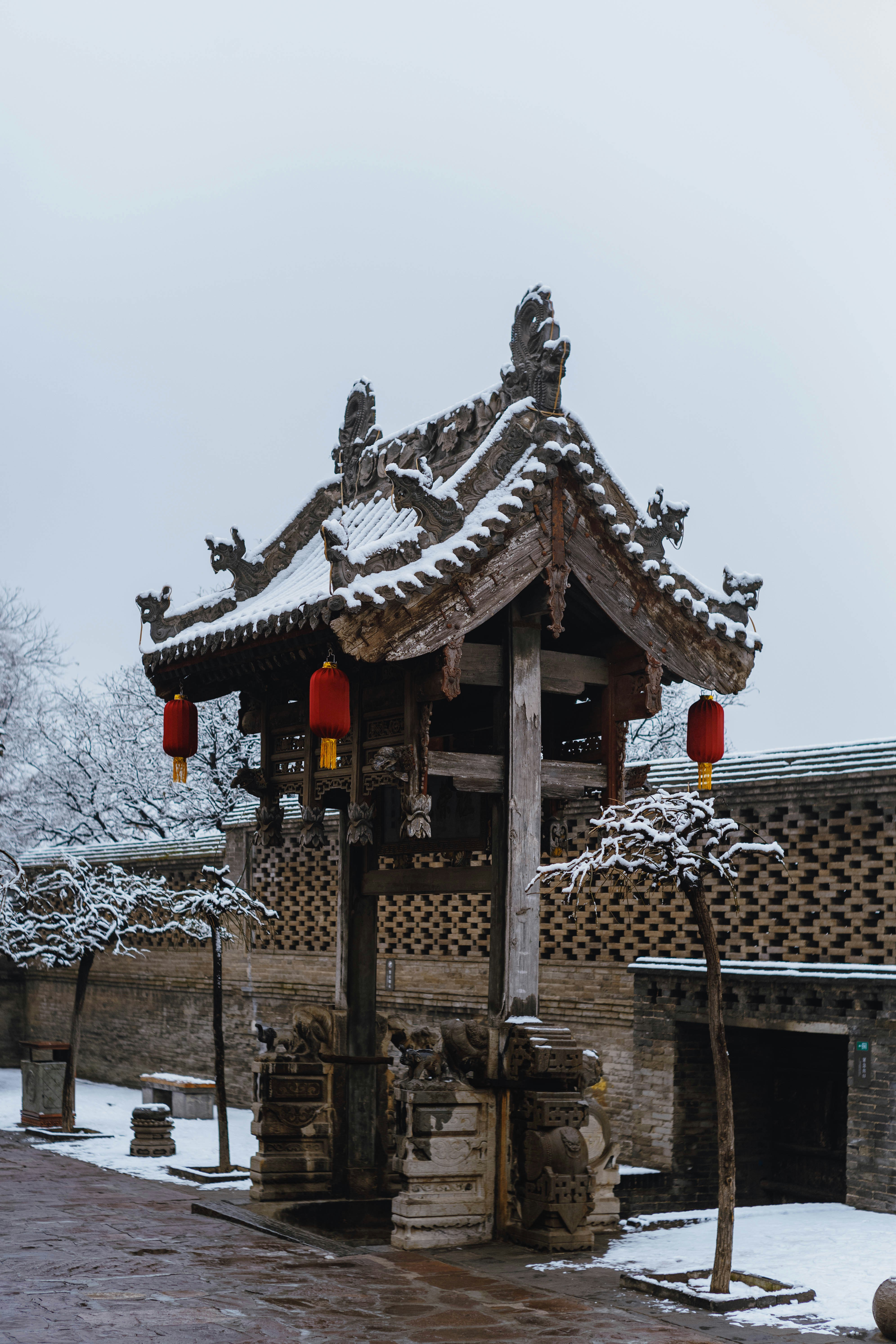 Snow-kissed Bell Gate Under a Quiet Snowfall