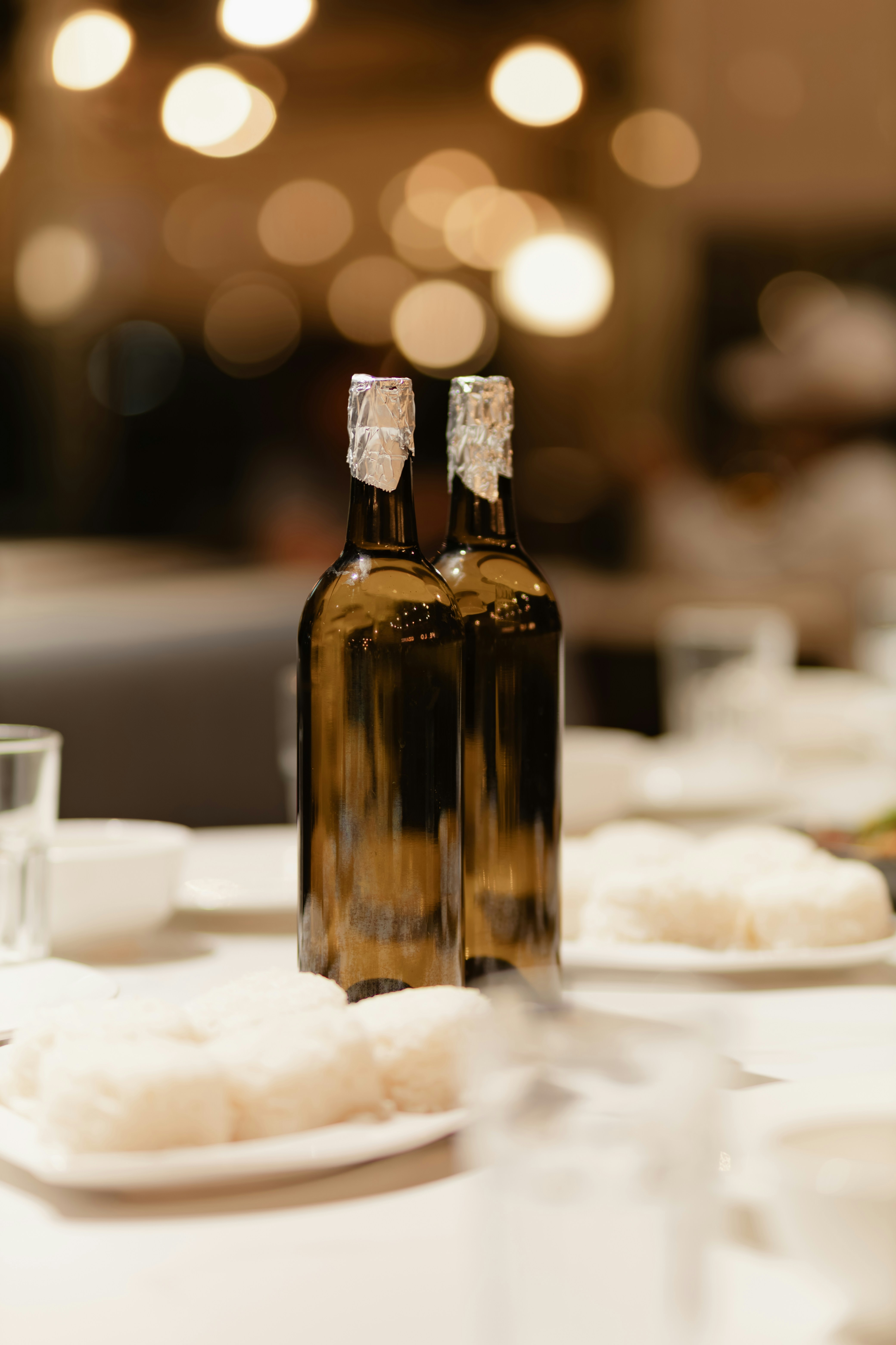 Twinned Bottles in Soft Bistro Light