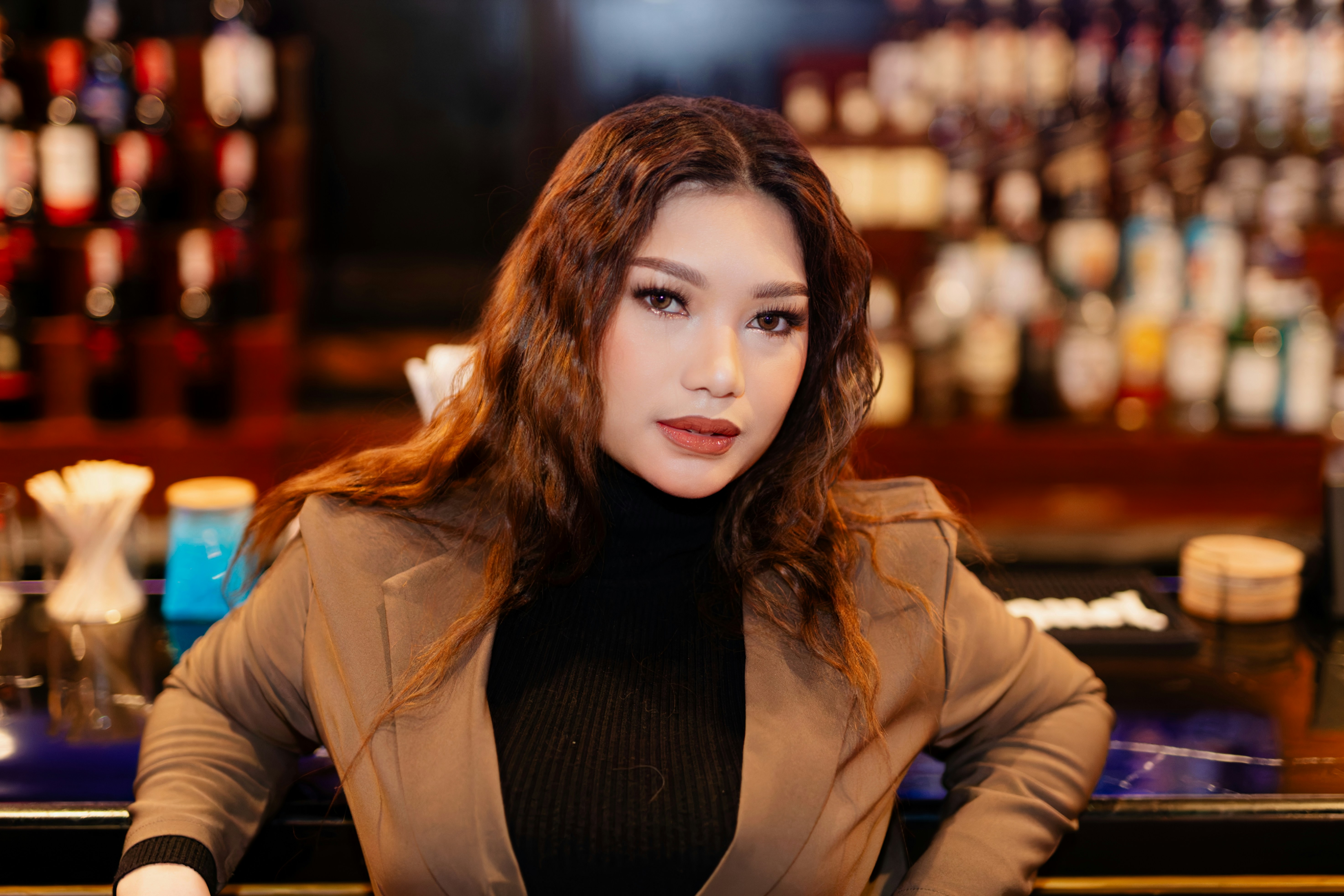 Bar Counter Confidence: A Pastel-Backlit Portrait in Warm Ambience