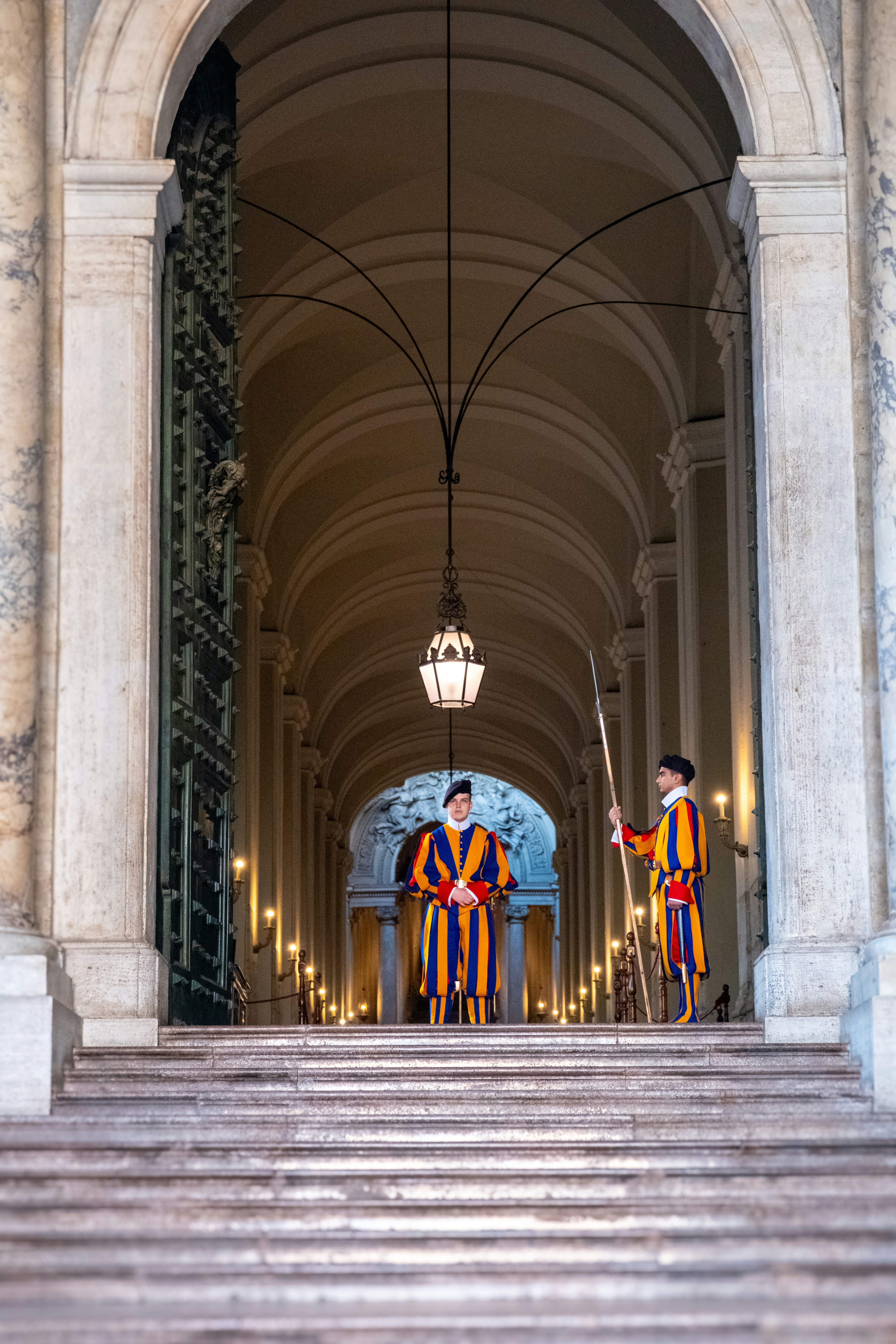 Colorful Guards at the Archway: An Evening in the Colonnade