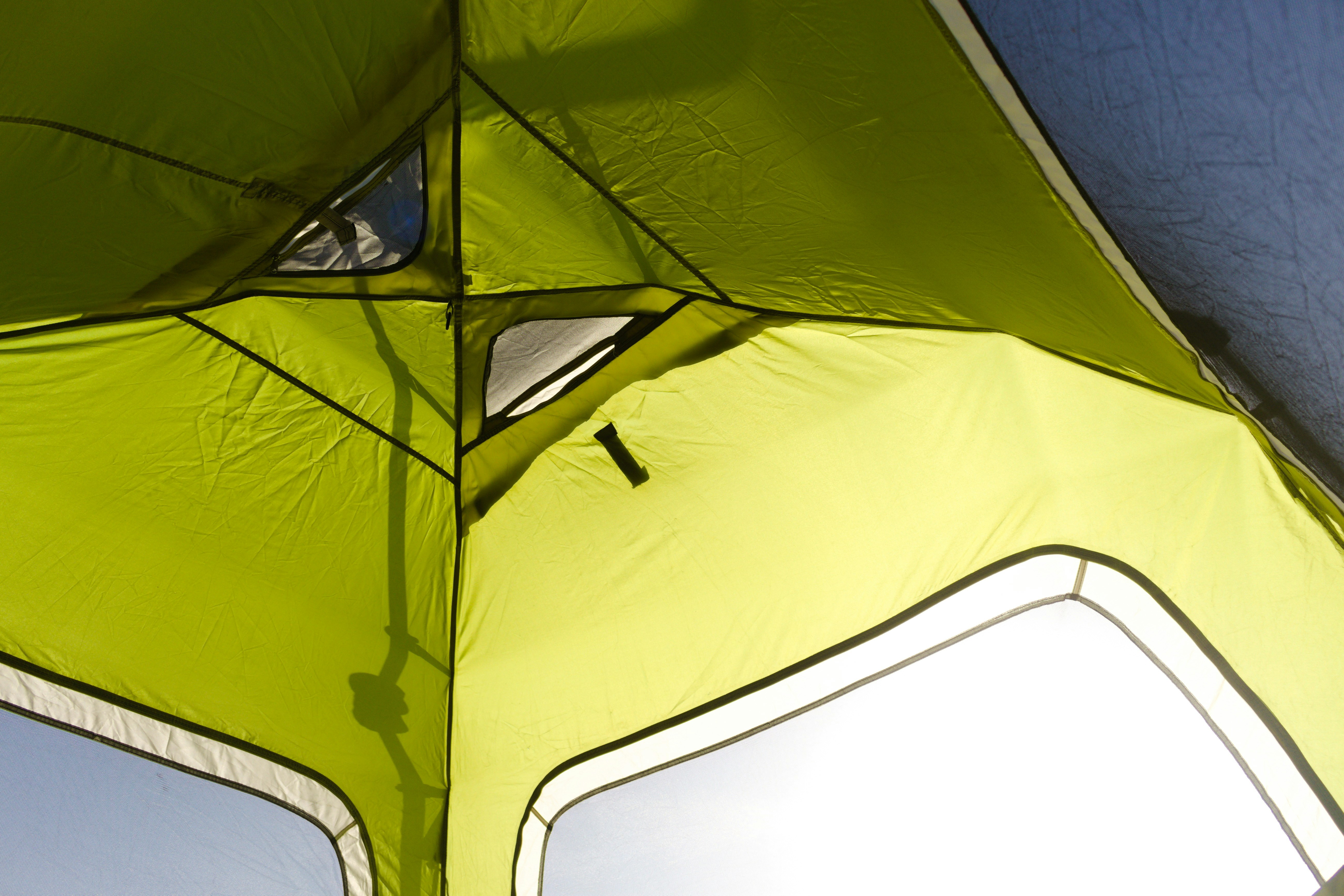 Luminous Lime shelter: close-up of a bright tent canopy in daylight