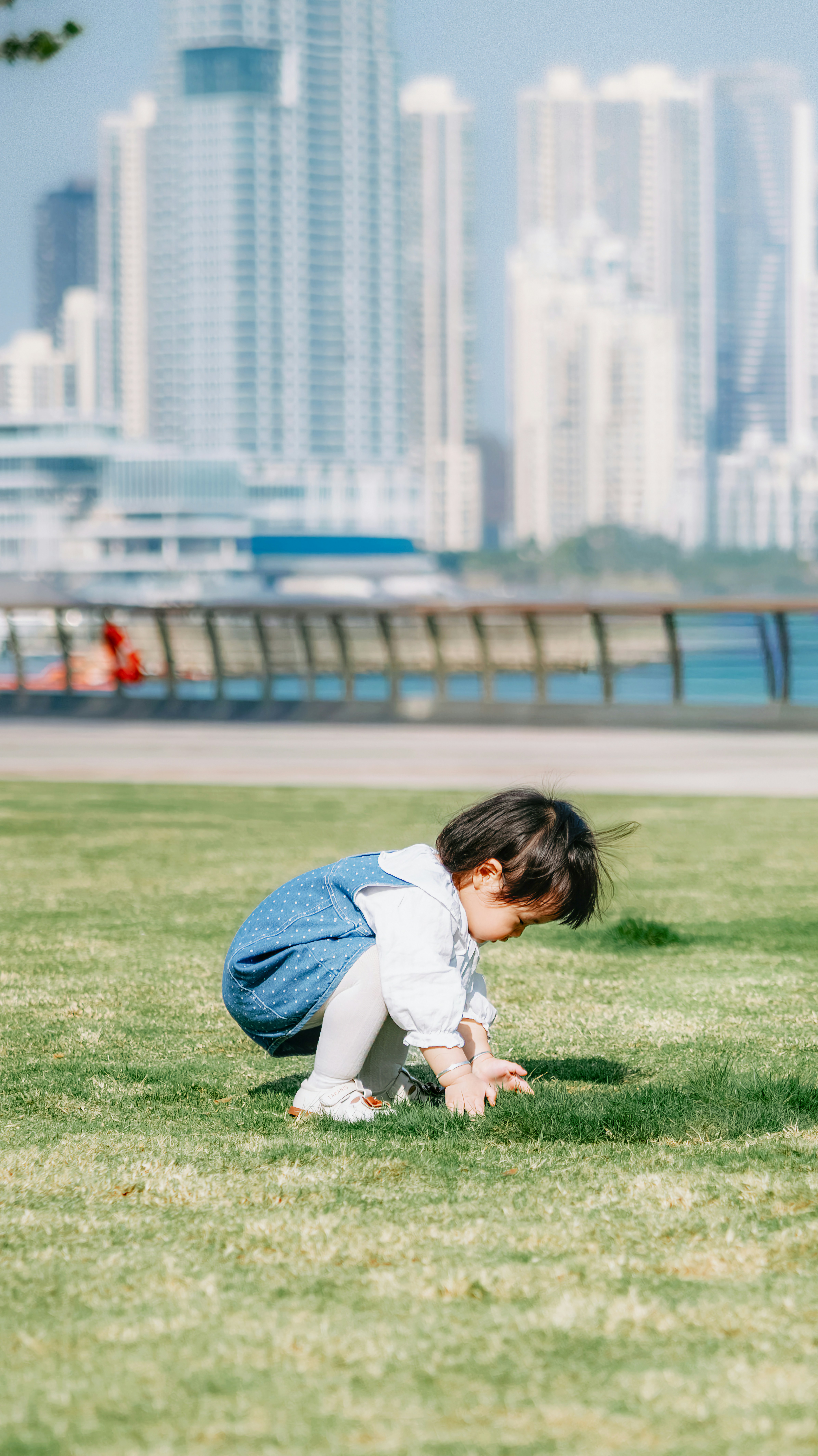 Grounded Curiosity: A Child Exploring a Sunlit Park
