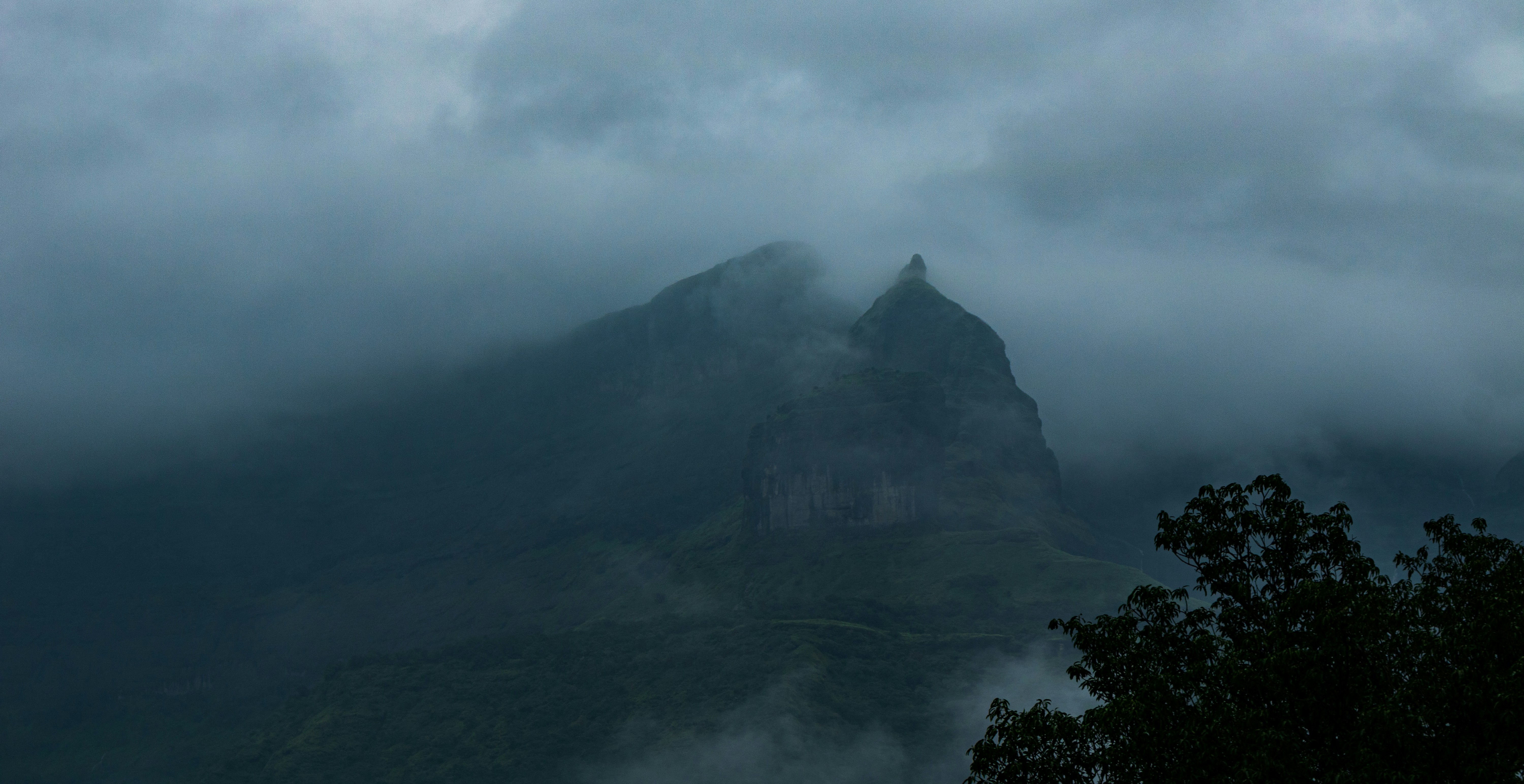 Mist-Clad Peak: A Quiet Sentinel Amid the Clouds