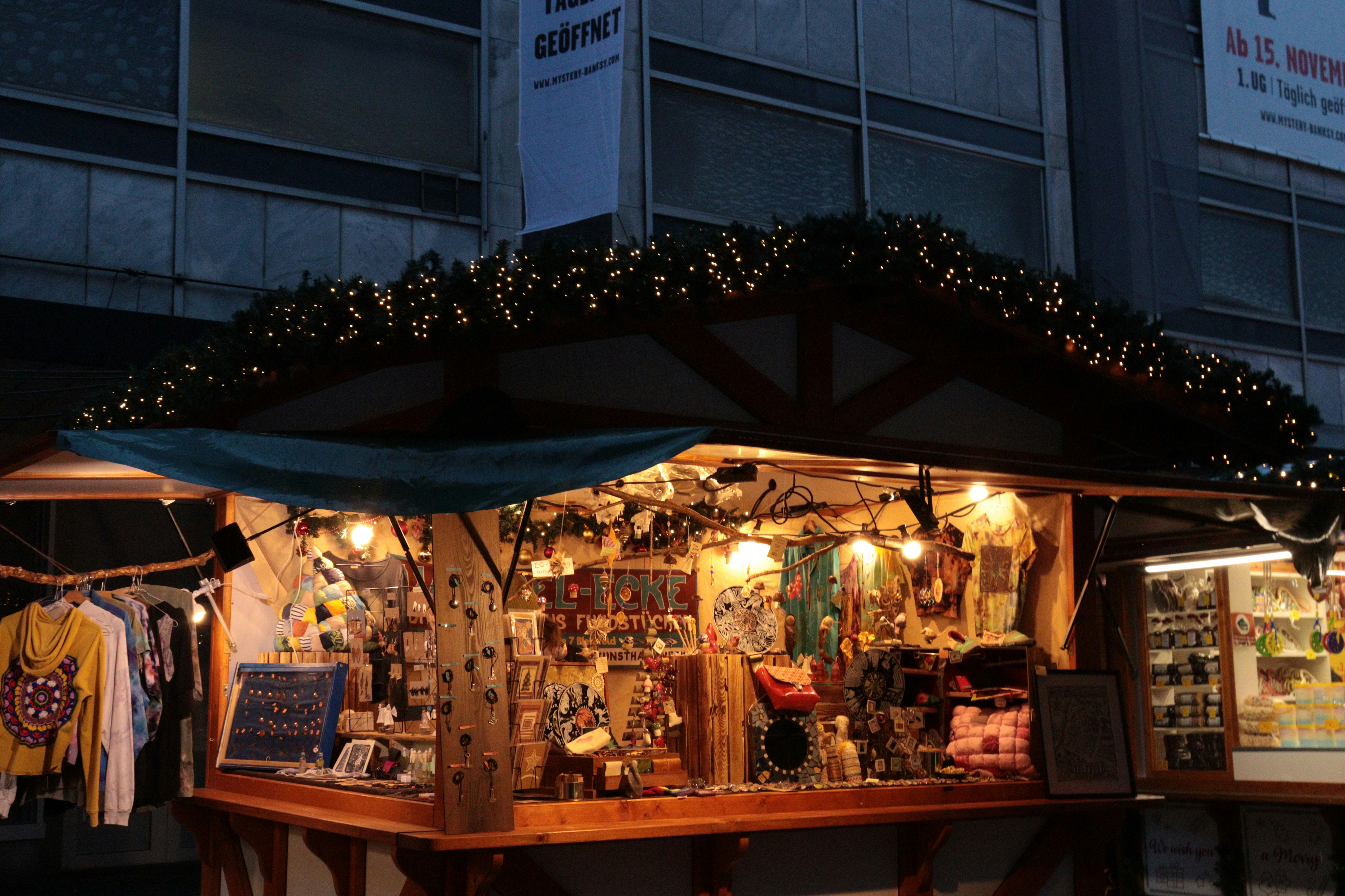 Warm Christmas Stall Illuminates a Quiet Evening Market