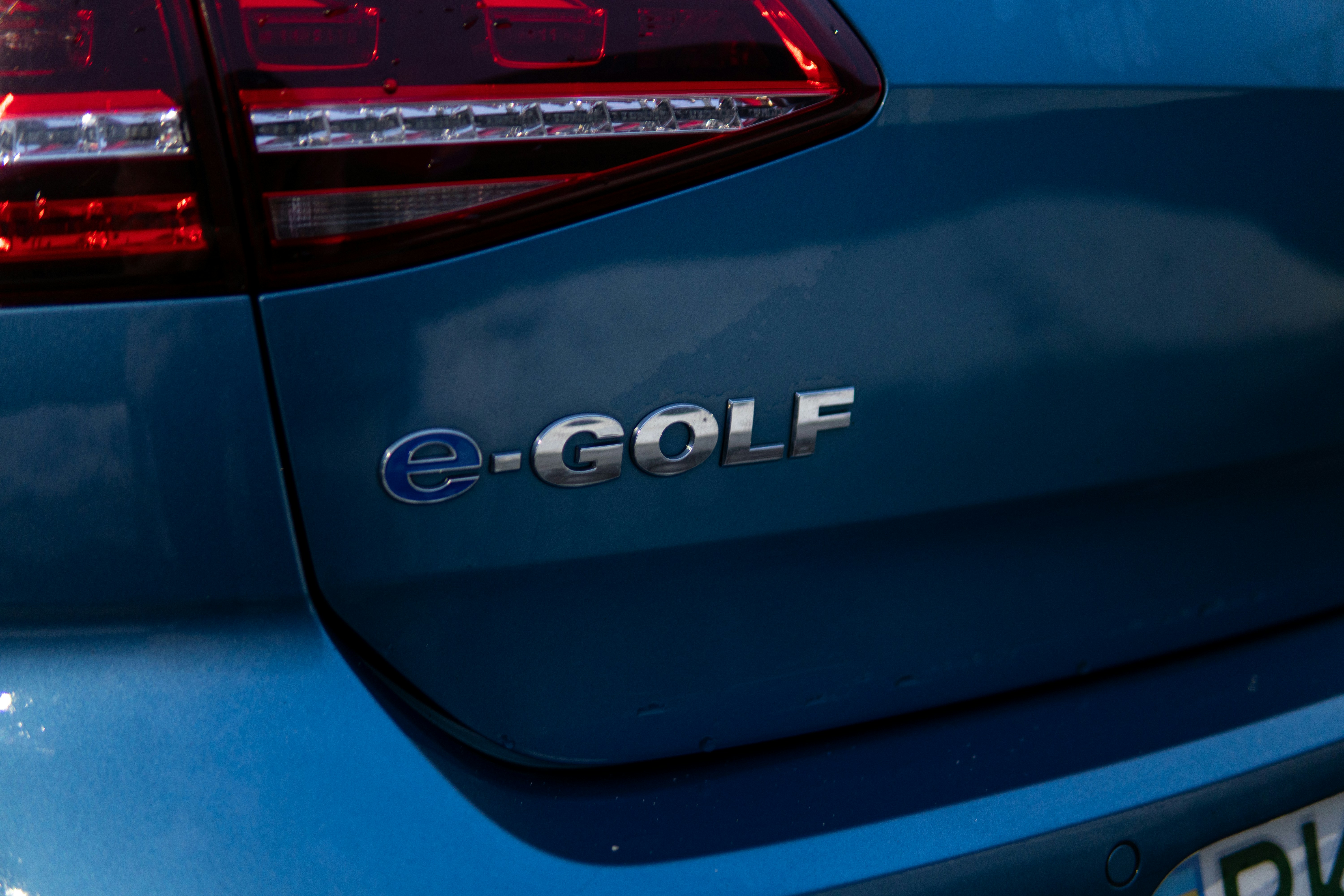 Blue Volkswagen e-Golf Emblem: Quiet Power on Painted Curves