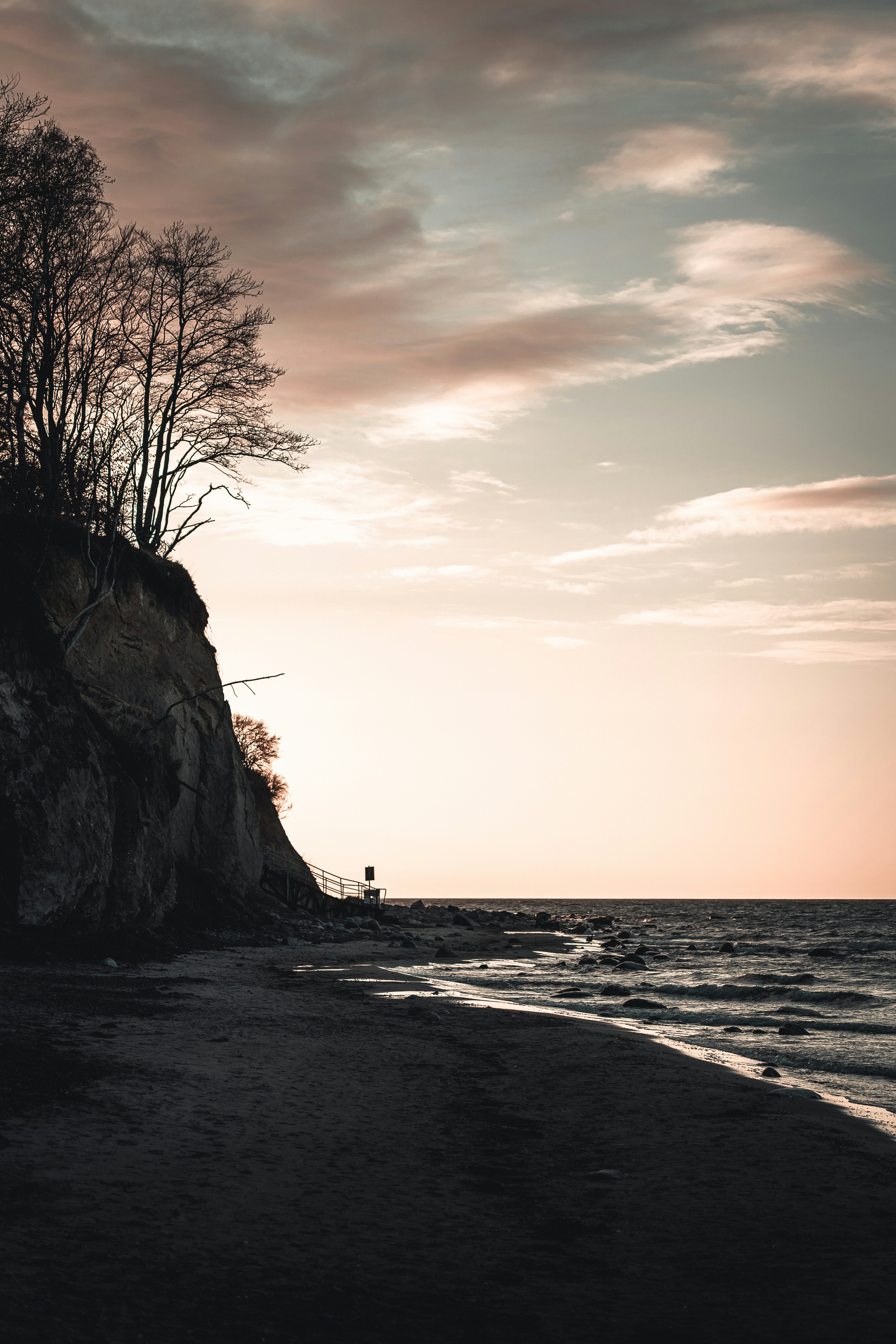 Cliffside Moonrise Over a Quiet Seashore