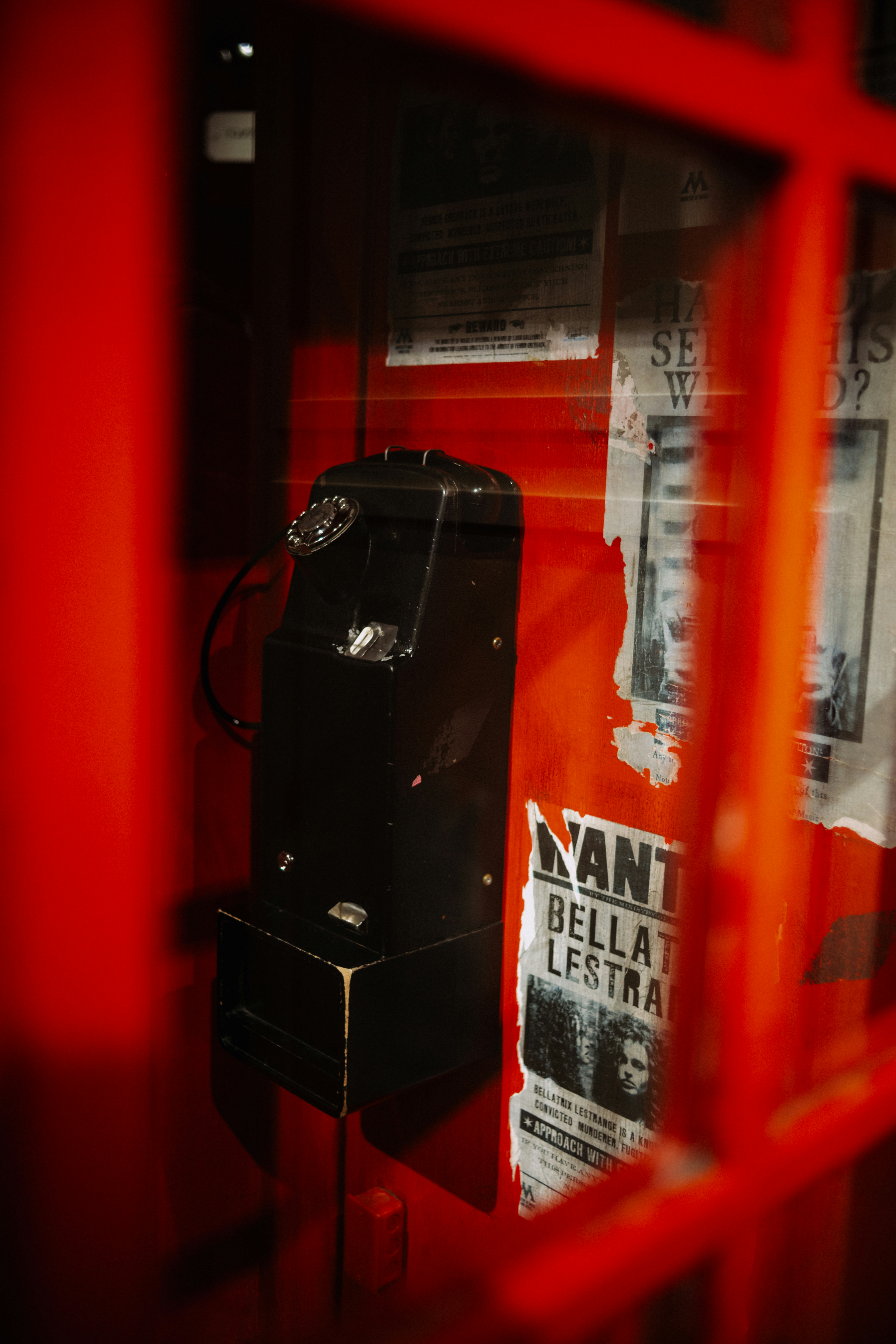 Red Phantom in a Kiosk: A Glimpse Through the Glass