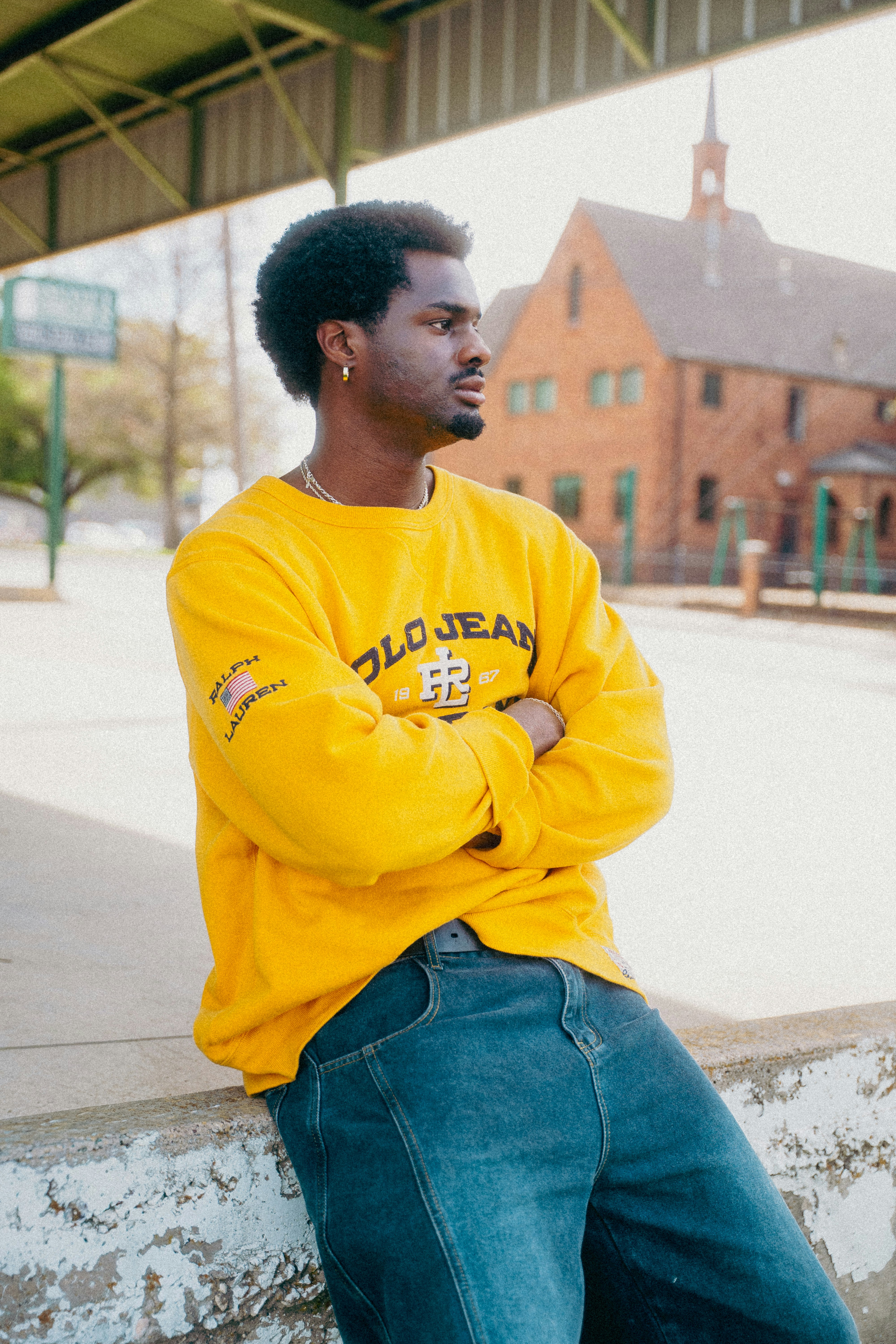 Yellow Sweatshirt, Quiet Resolve: Portrait Under the Overhang