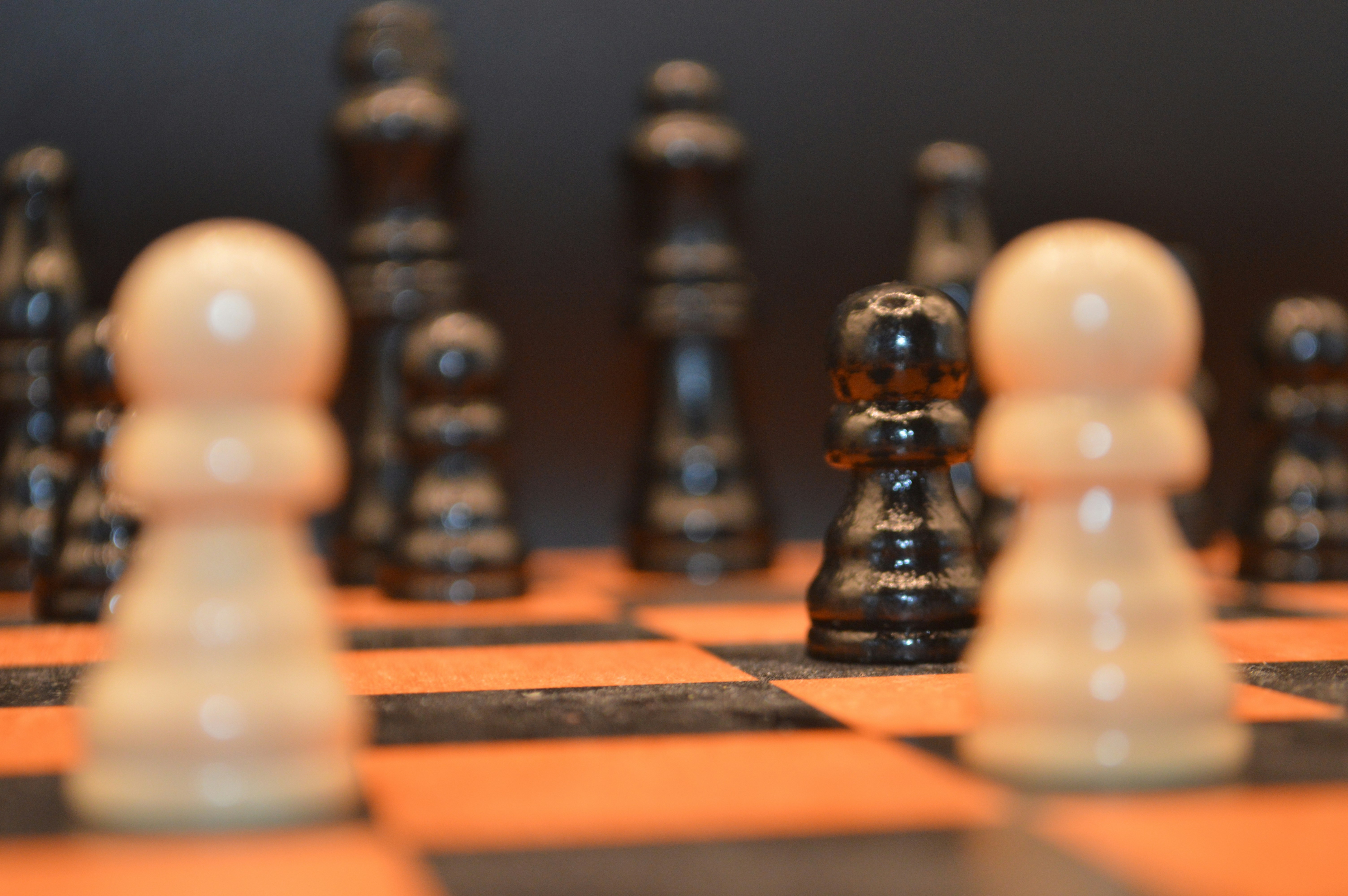 Near-Center Pawn Duel: A Low-Angle Chessboard Close-Up