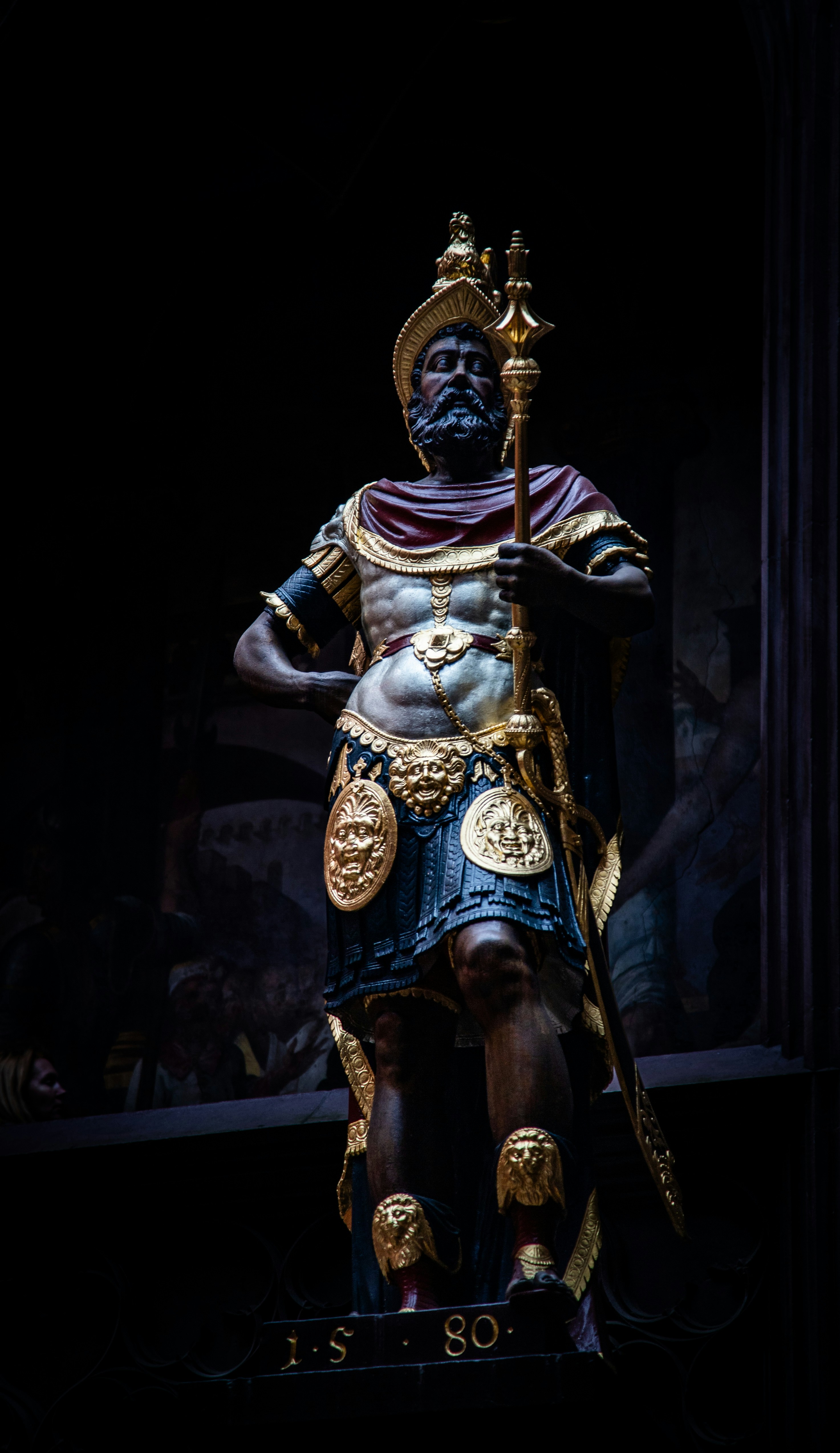 Statuesque Warrior of Gold and Shadow