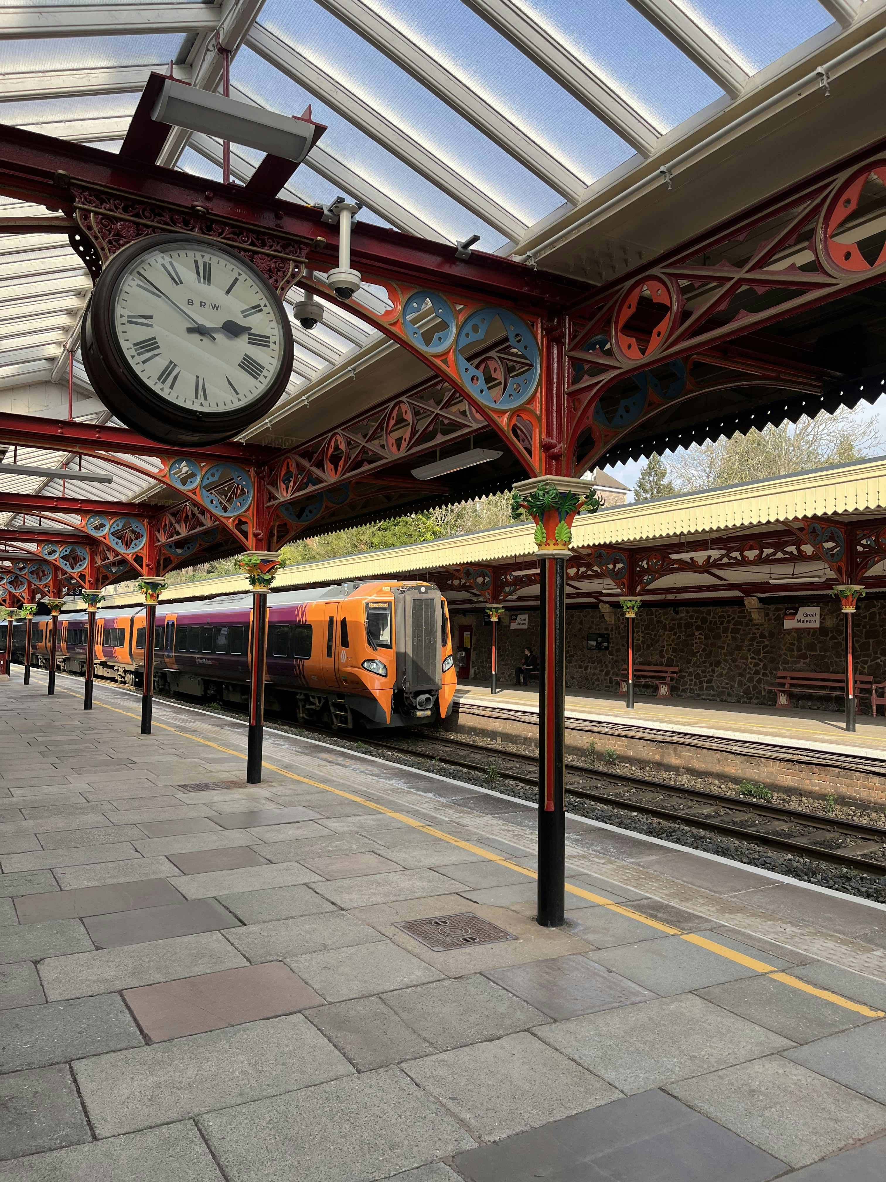 Clock, Carriage, and Rails: Timeless Waiting at the Platform
