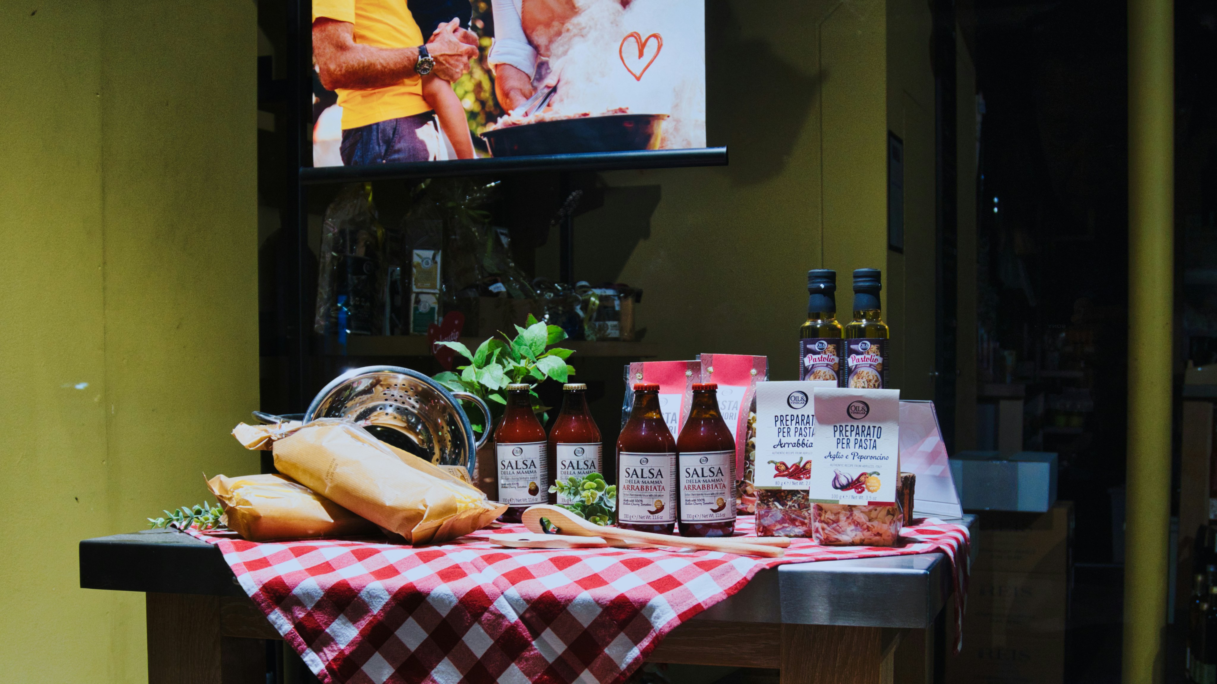 Larder at Dusk: A Market Table of Condiments and Bottled Goods